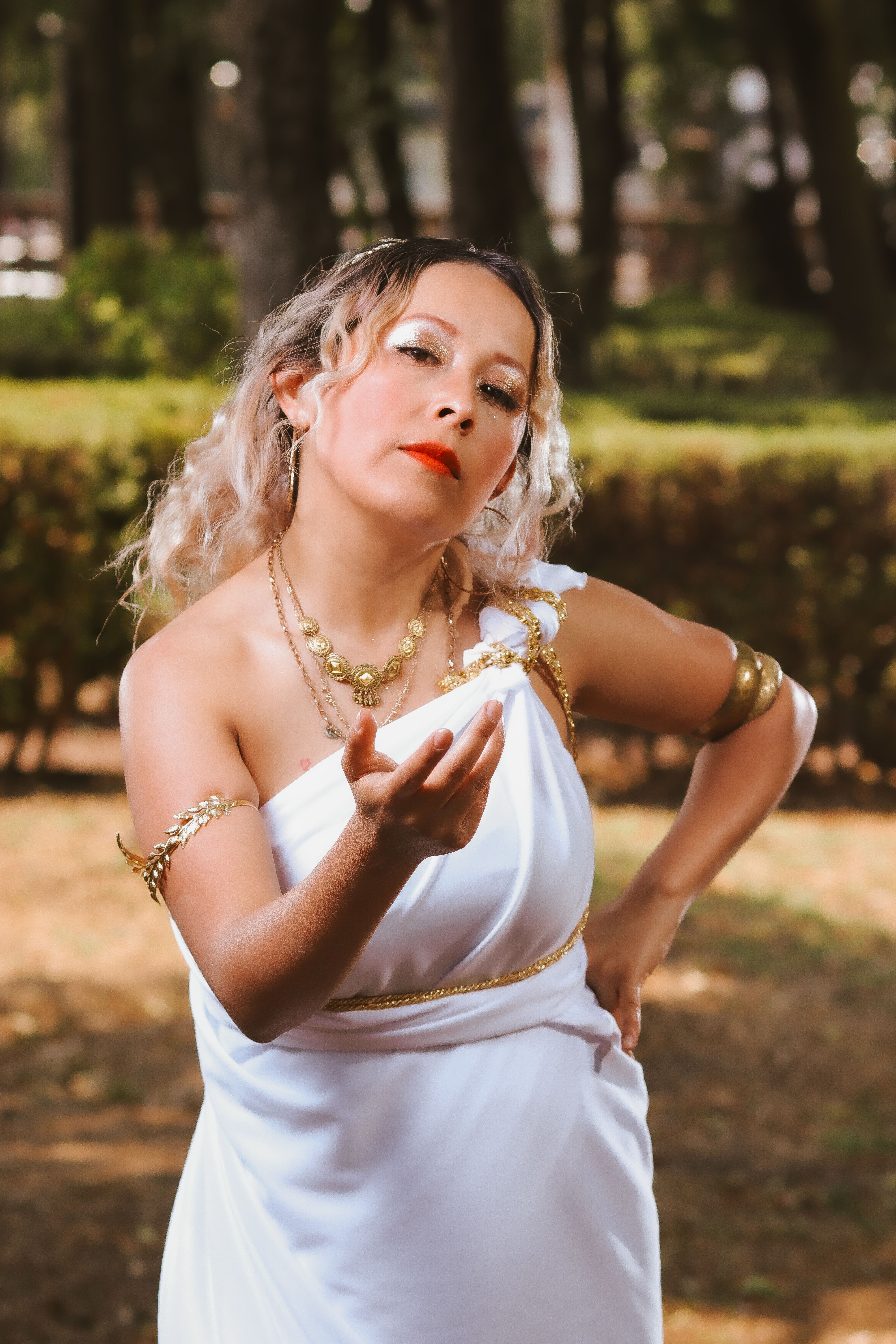 Elegant Woman in Classic Greek Inspired Fashion · Free Stock Photo