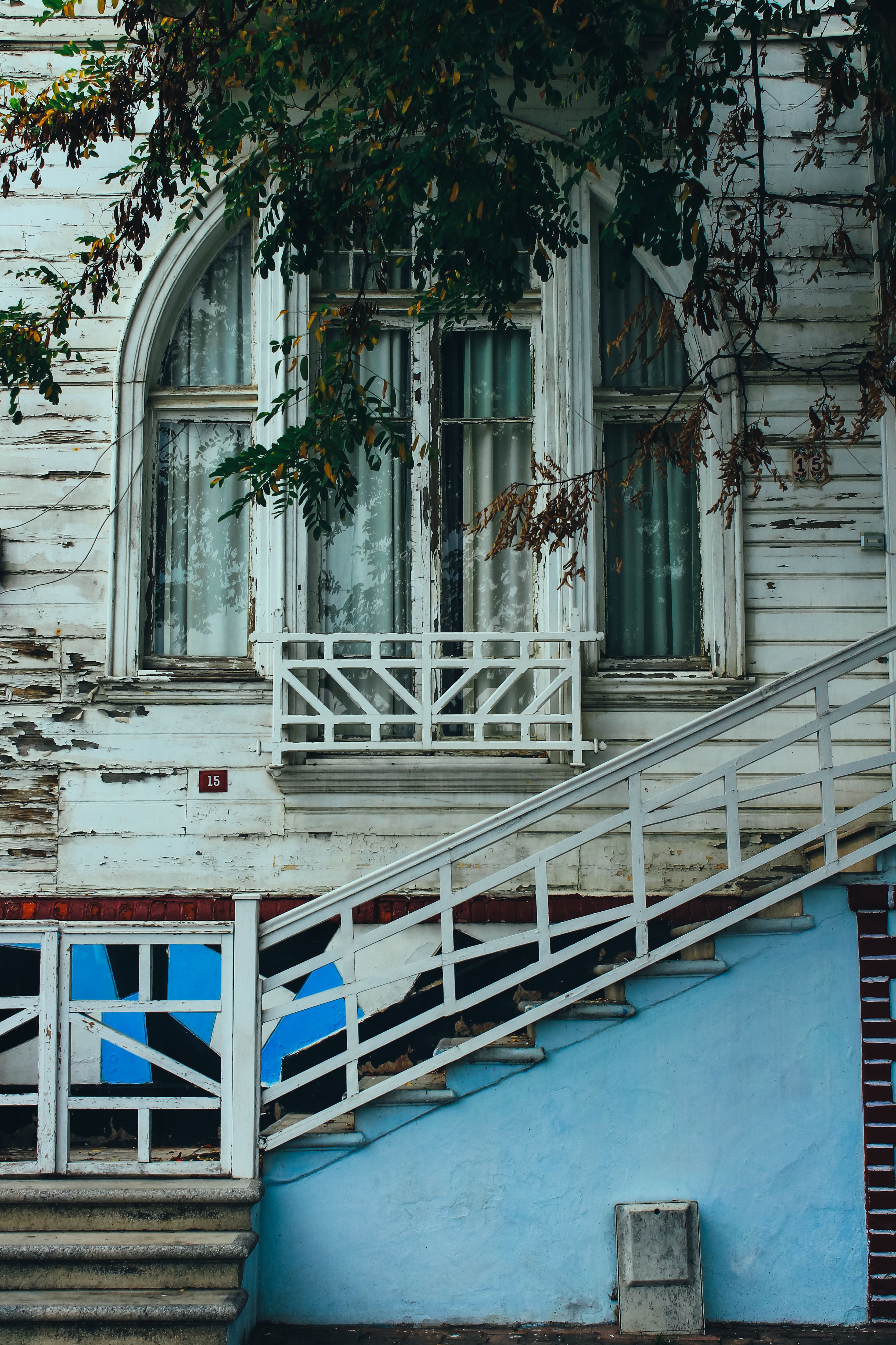 Vintage White Wooden House with Arched Window · Free Stock Photo