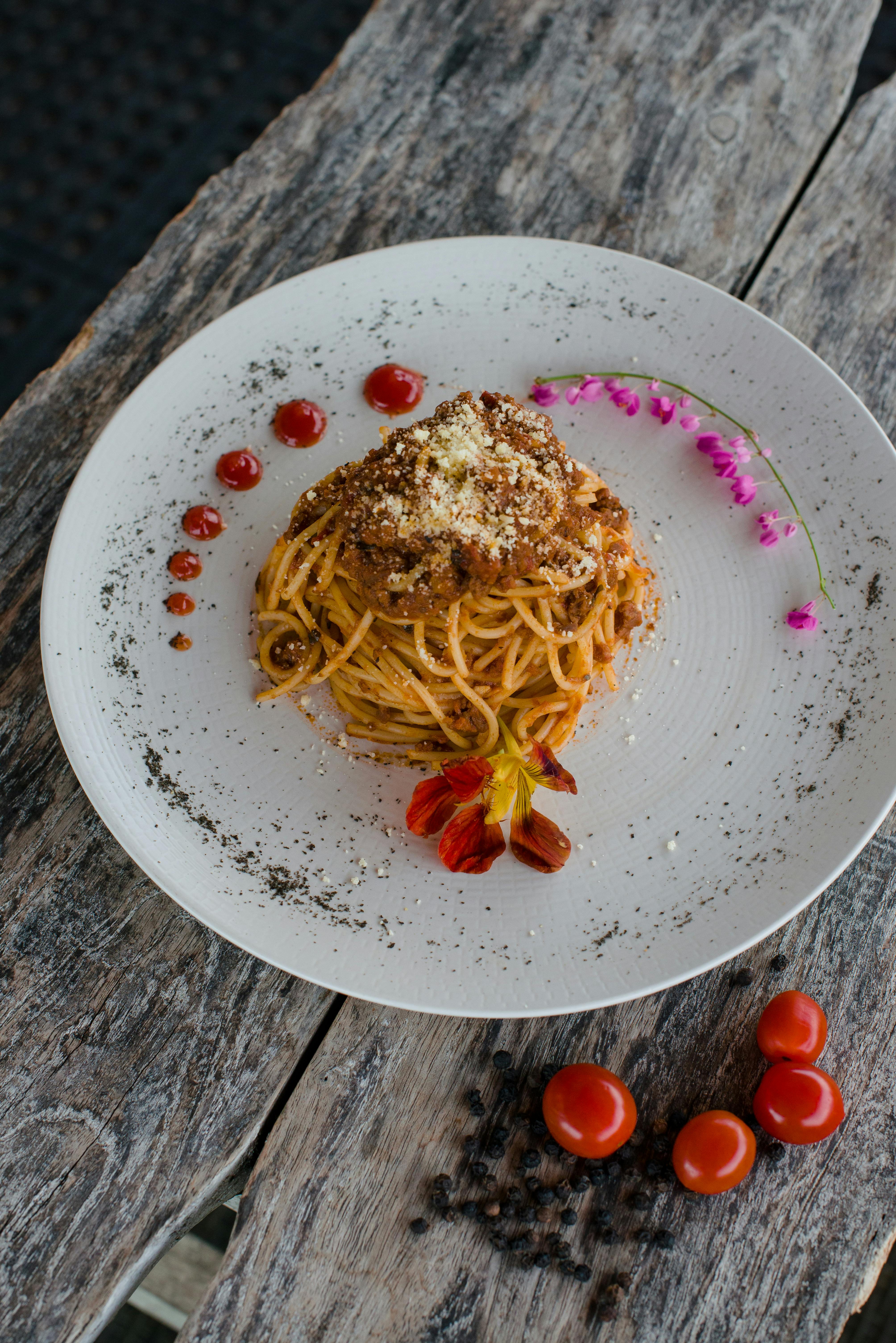 Gourmet Spaghetti Dish with Toppings in Bali · Free Stock Photo