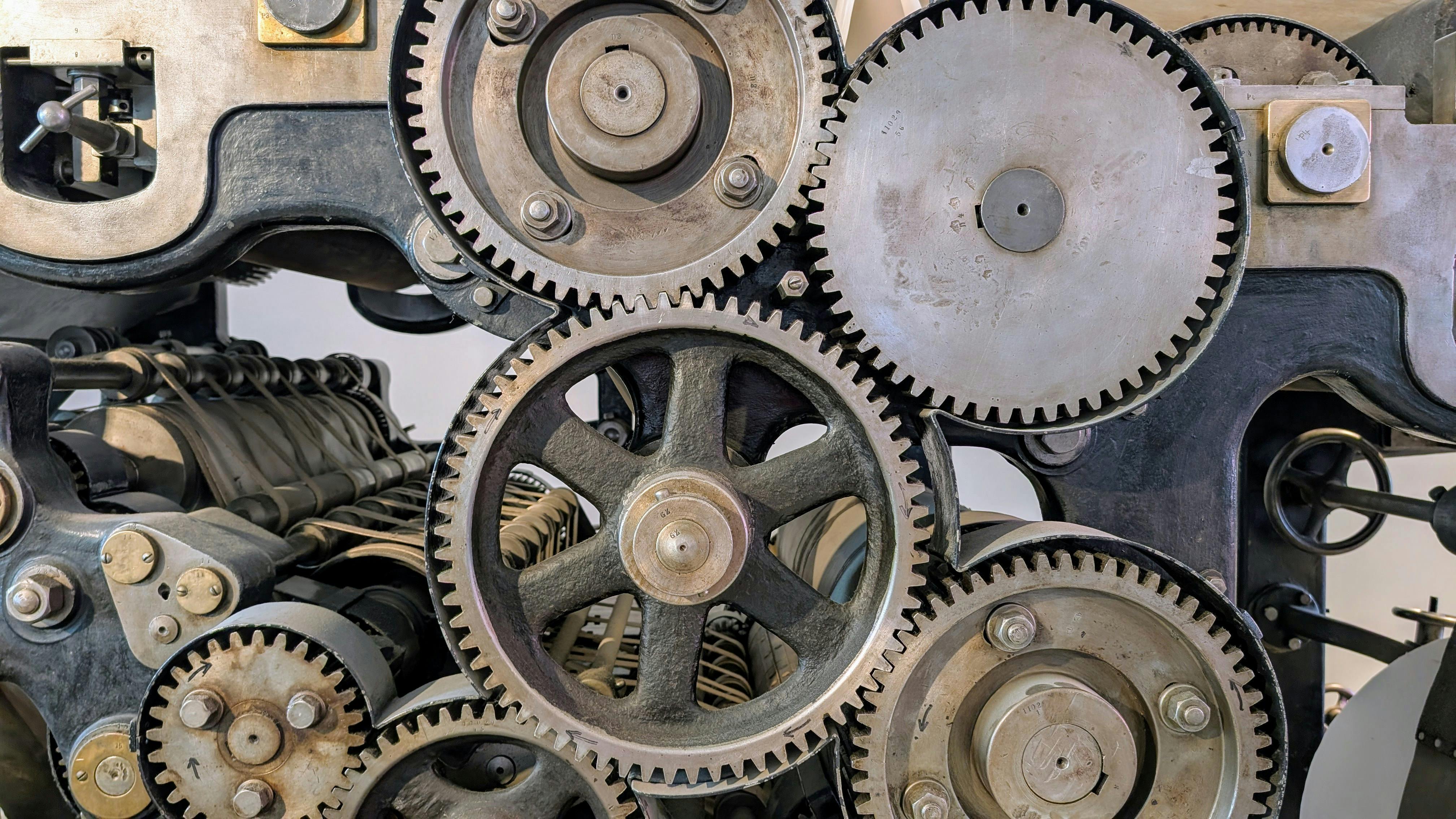 Intricate Machine Gears in Industrial Setting · Free Stock Photo