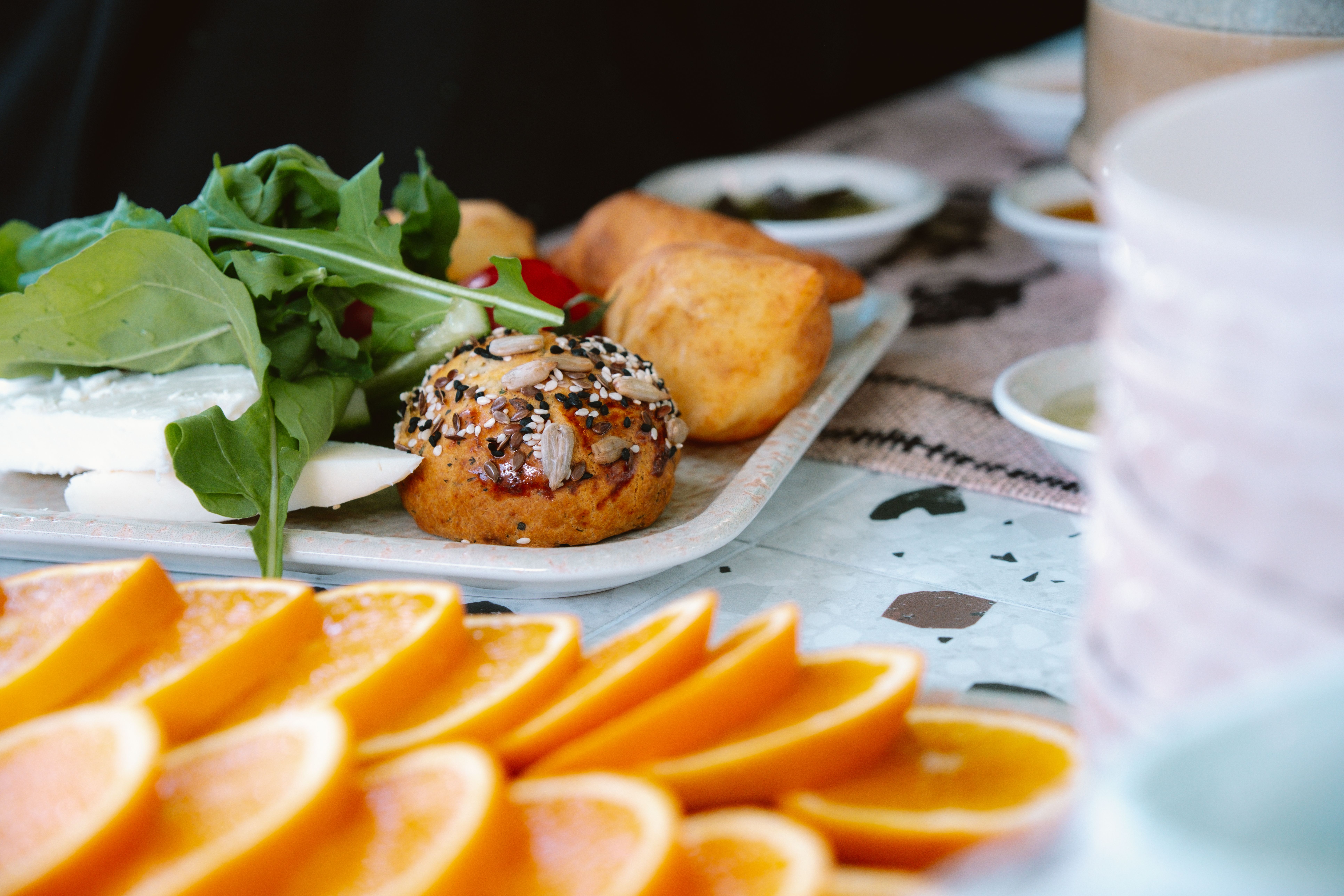Delicious Brunch Spread with Fresh Orange Slices · Free Stock Photo