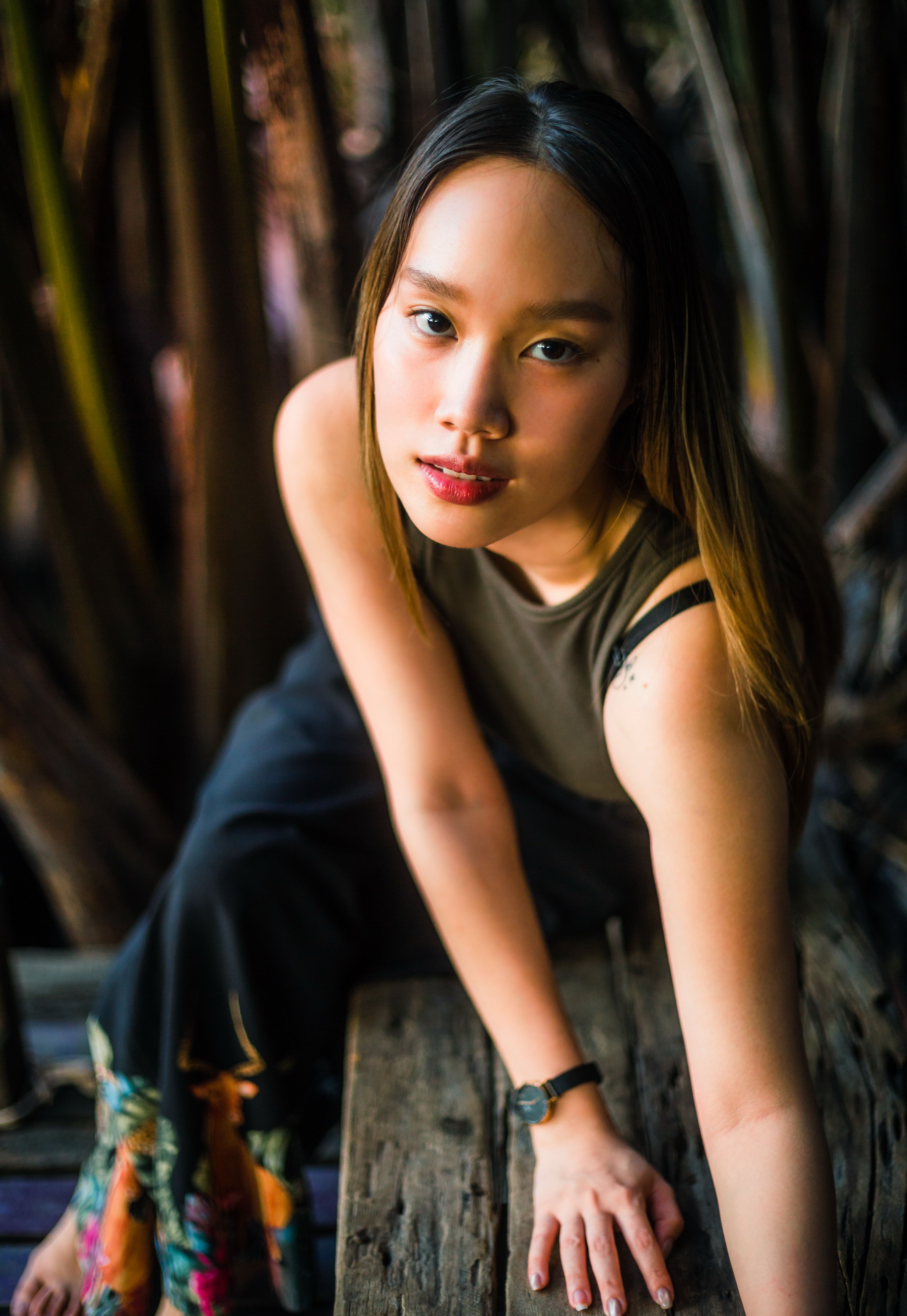 Portrait of Young Woman in Natural Light Outdoors · Free Stock Photo