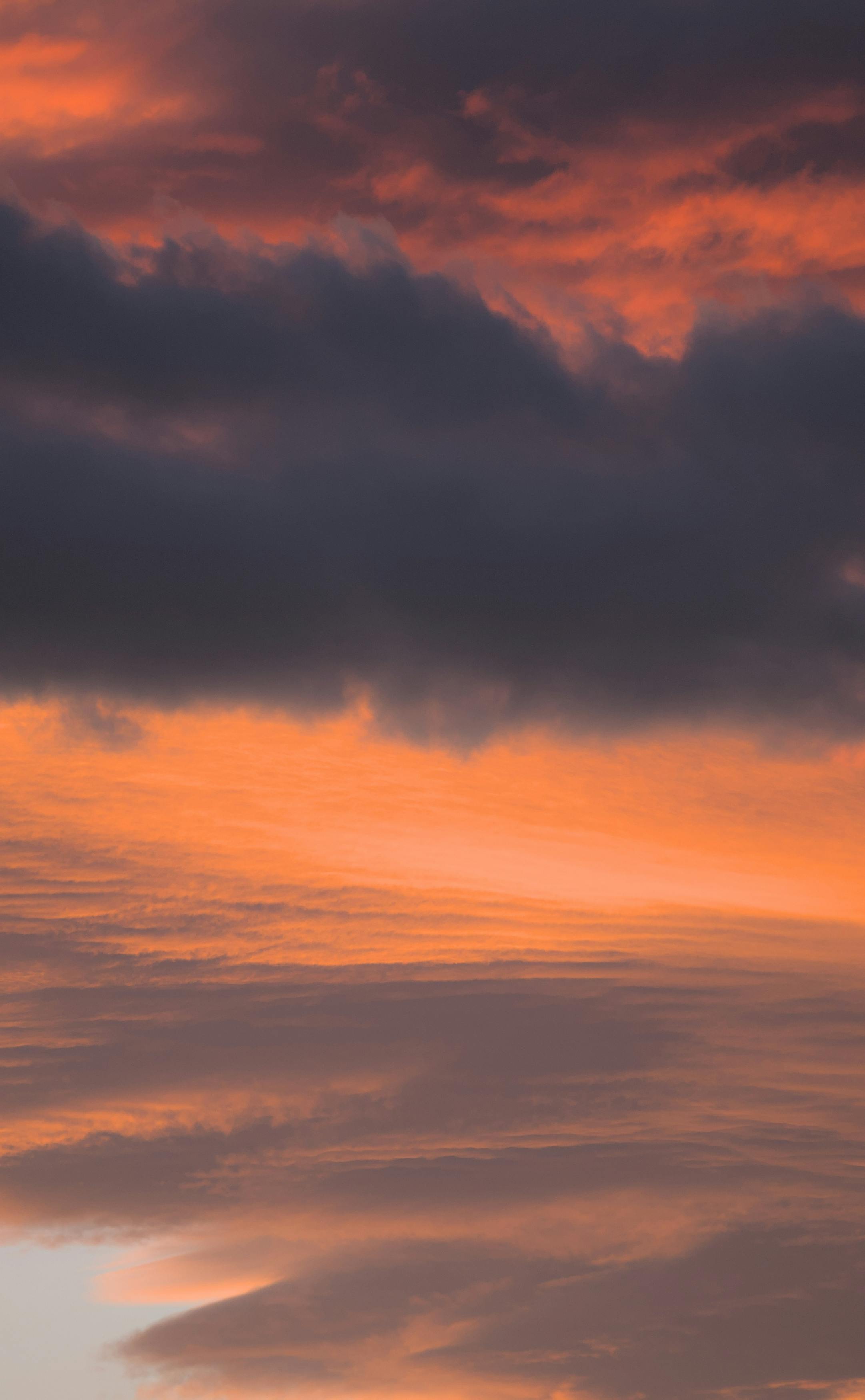 Dramatic Orange and Grey Sunset Clouds · Free Stock Photo