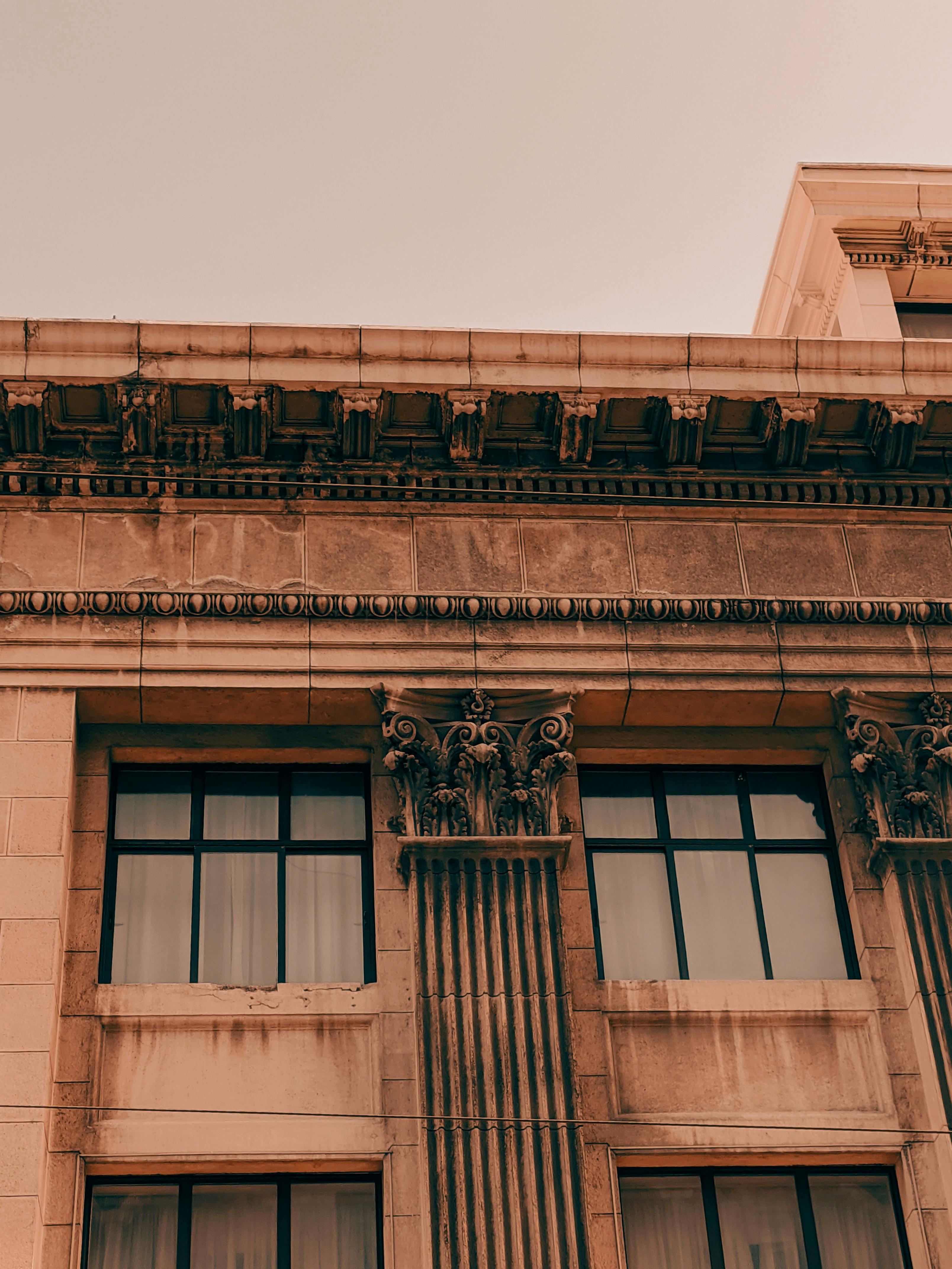 Elegant Greek-Inspired Architecture Facade · Free Stock Photo