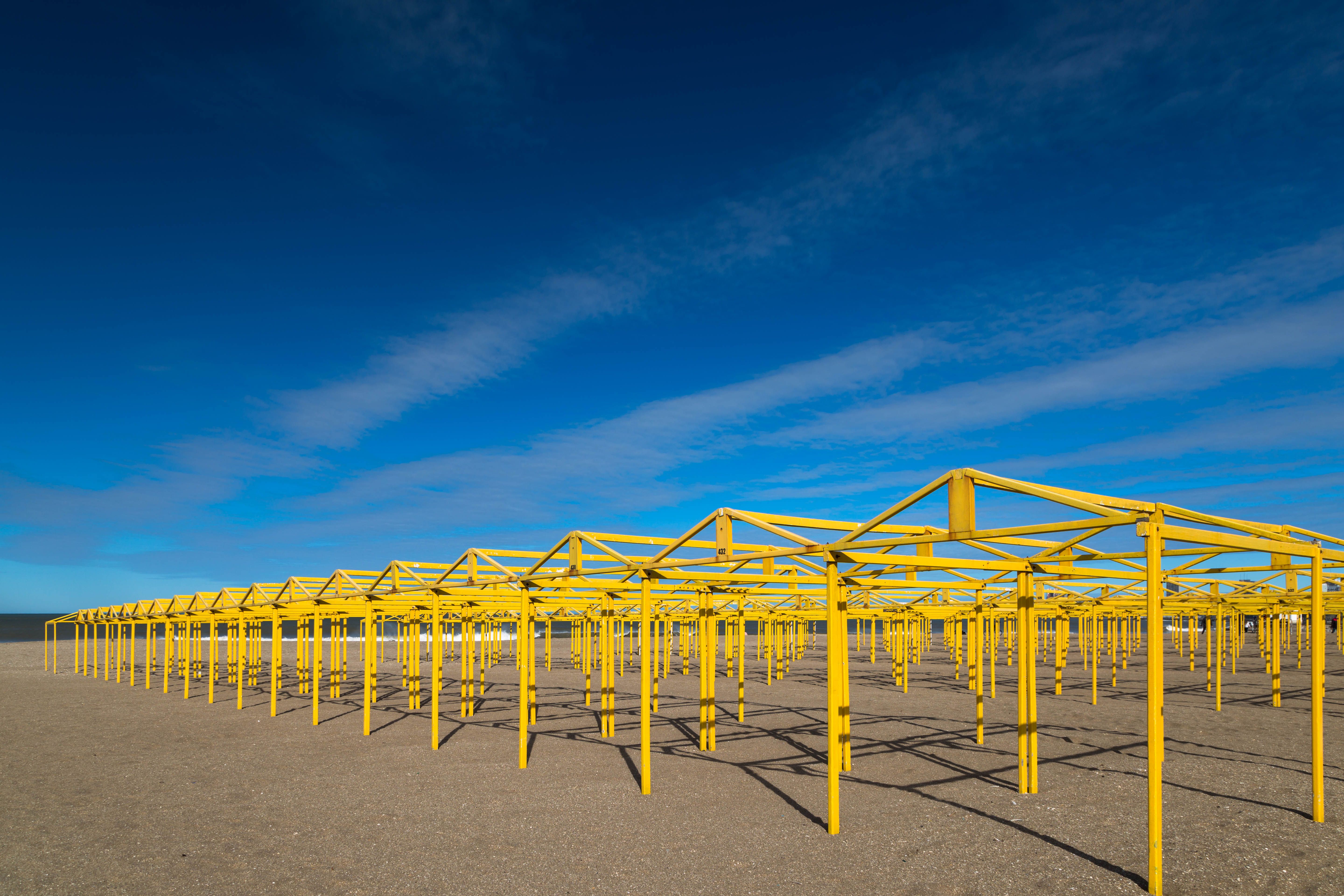 Yellow Metal Structures on Mar del Plata Beach · Free Stock Photo
