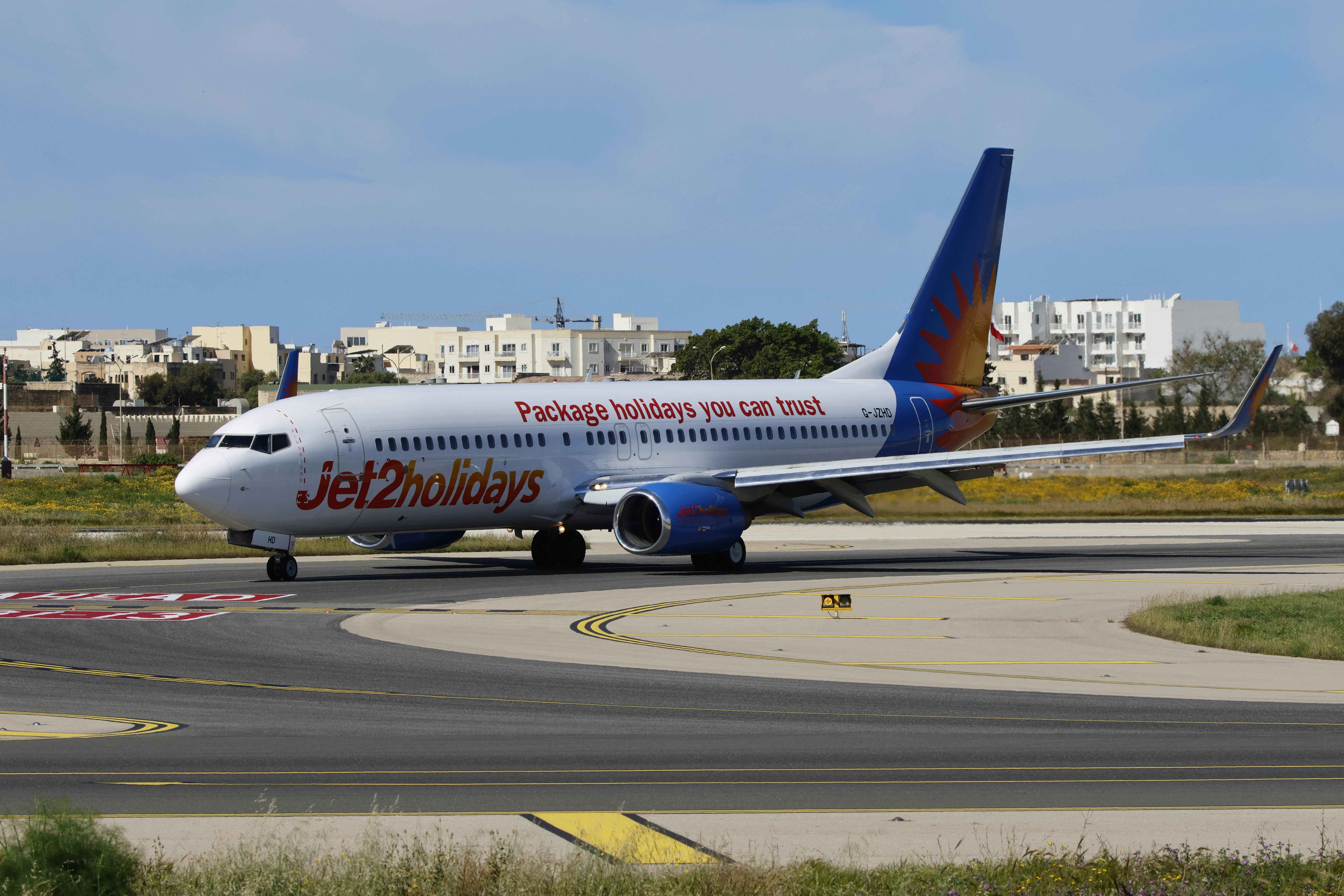 Jet2Holidays Plane on Airport Runway in Daylight · Free Stock Photo