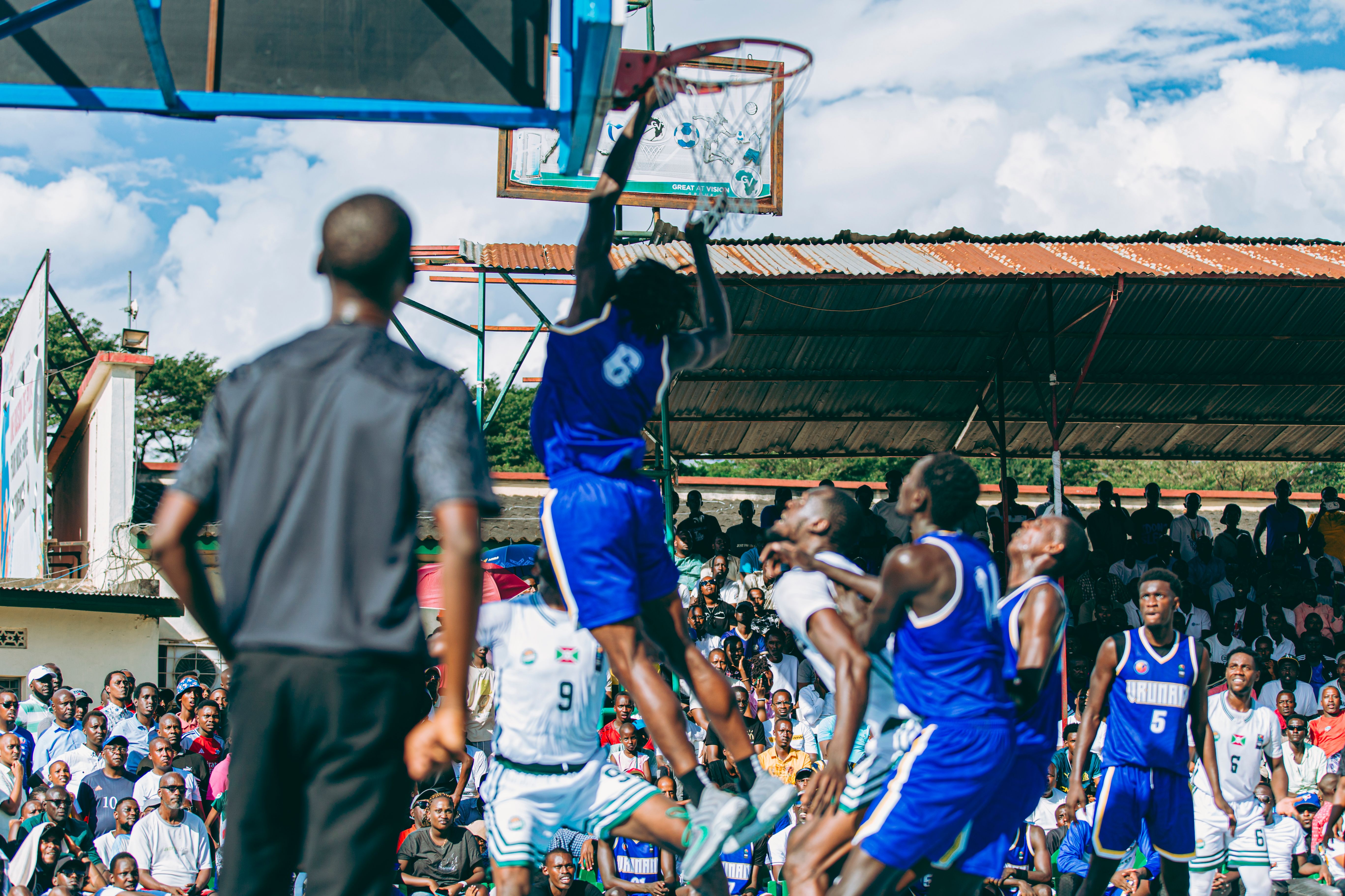 Exciting Outdoor Basketball Game Action Shot · Free Stock Photo