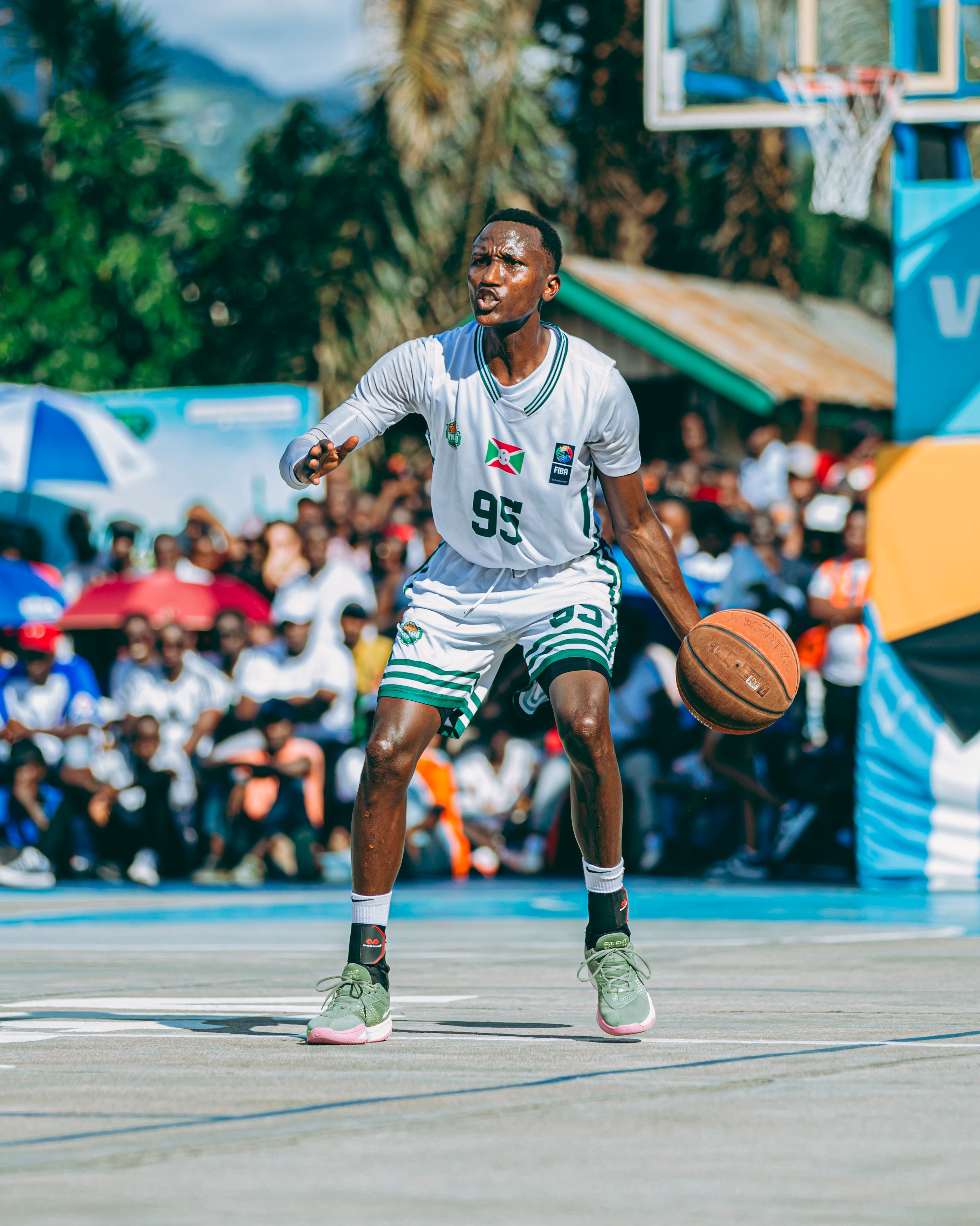 Intense Outdoor Basketball Game Action Shot · Free Stock Photo