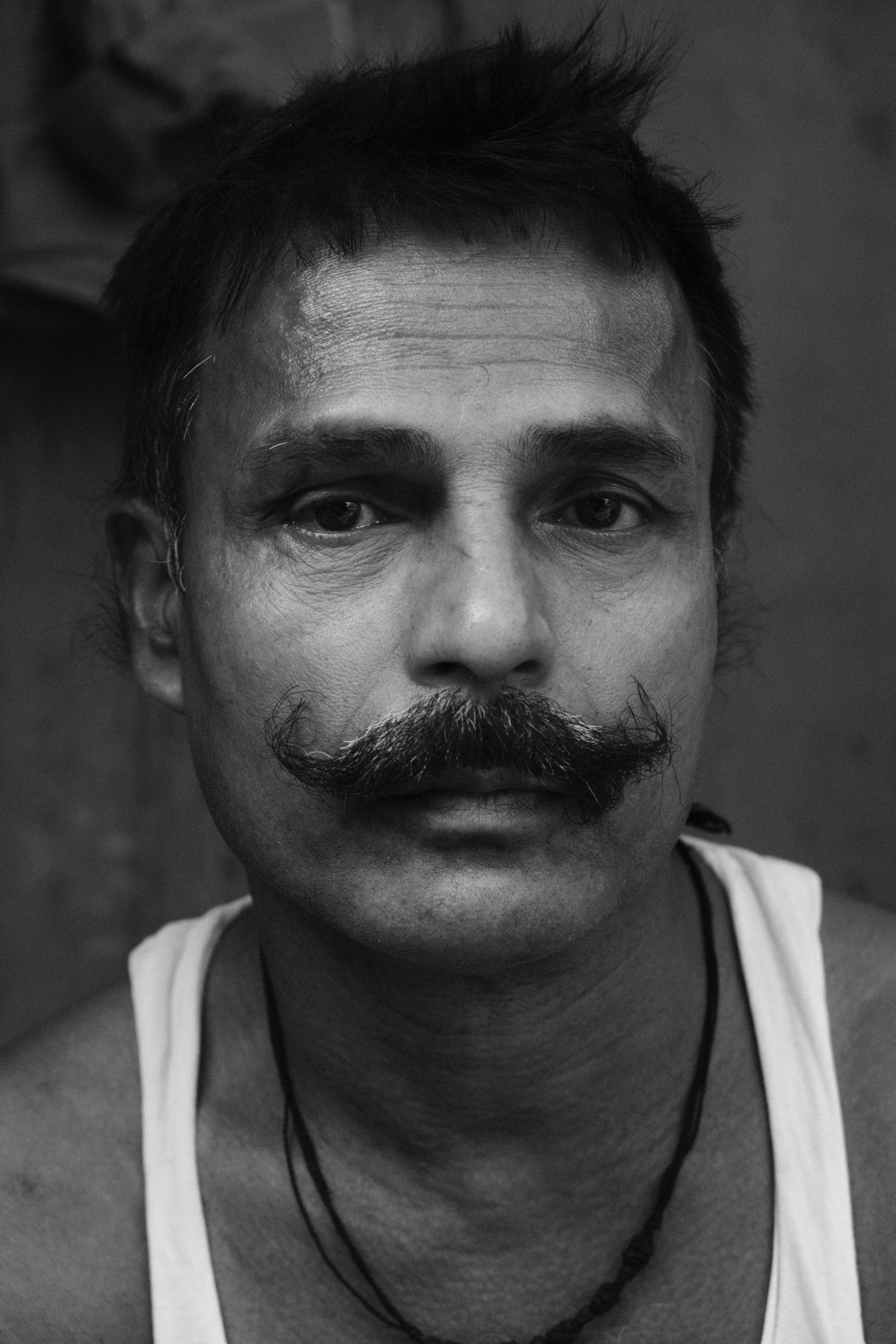 Black and White Portrait of a South Asian Man · Free Stock Photo