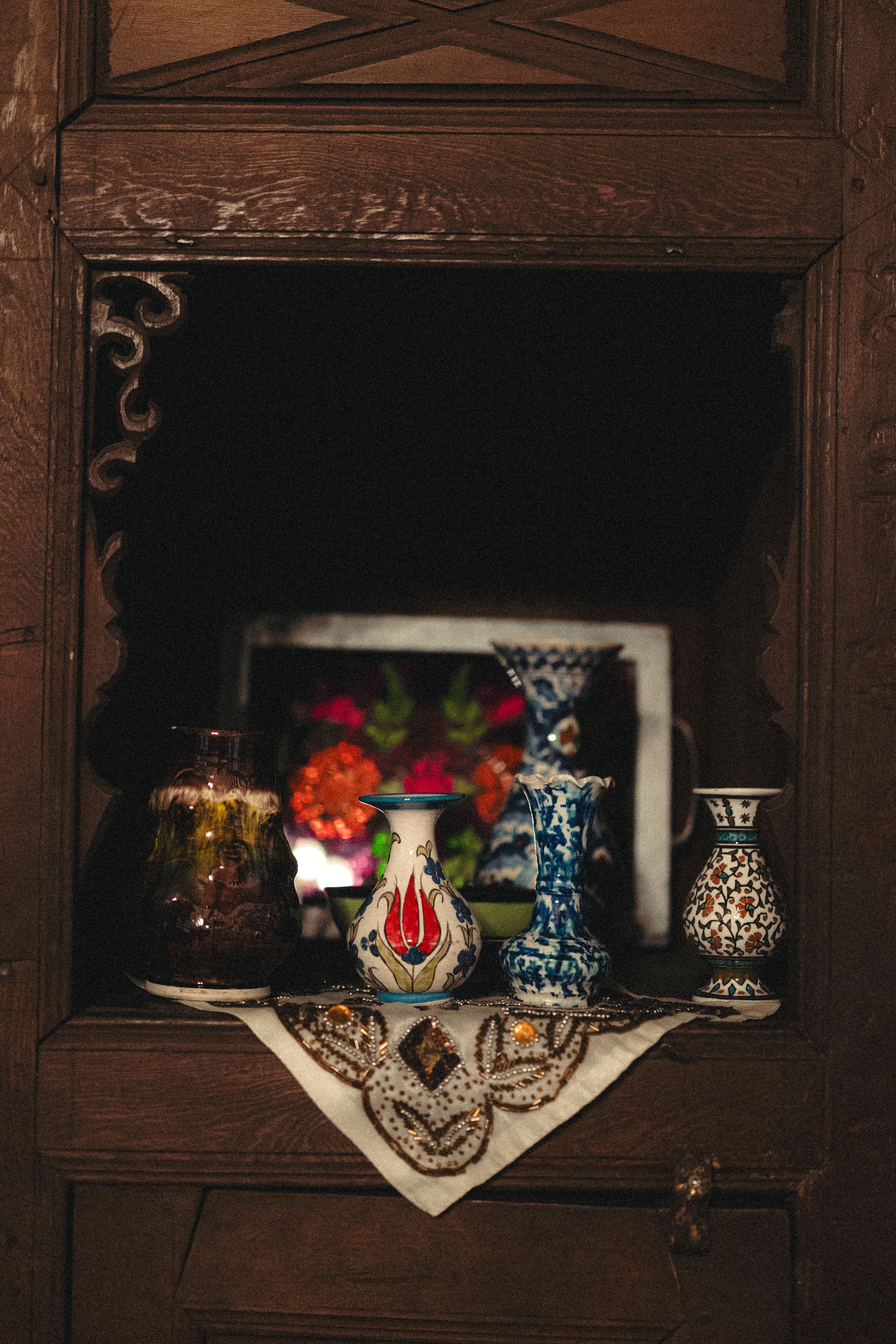 Elegant Display of Ornate Ceramic Vases in Rustic Setting · Free Stock ...