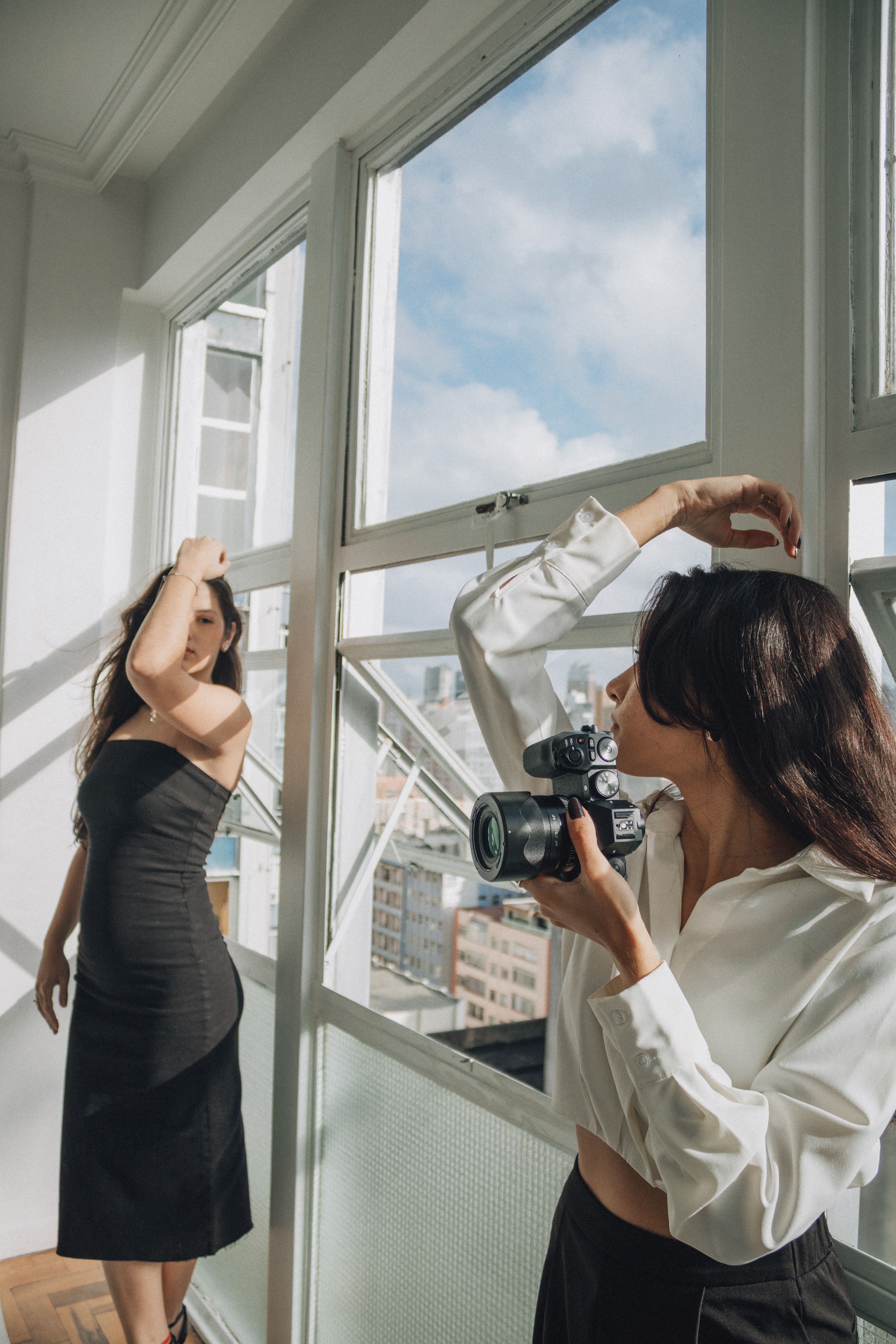 Fashion Photography Session in Sunlit Urban Studio · Free Stock Photo