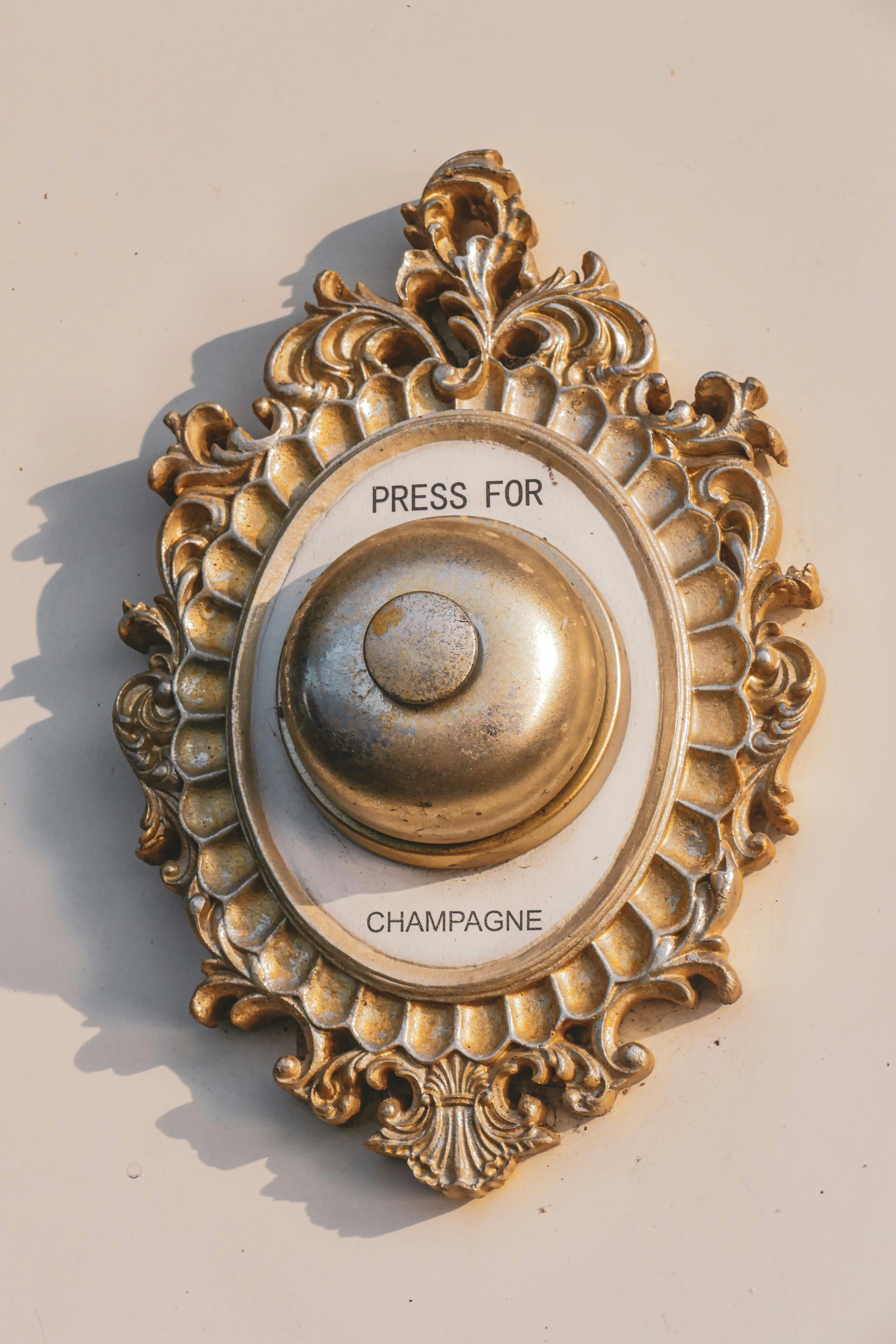 Elegant Vintage Doorbell for Champagne Press · Free Stock Photo