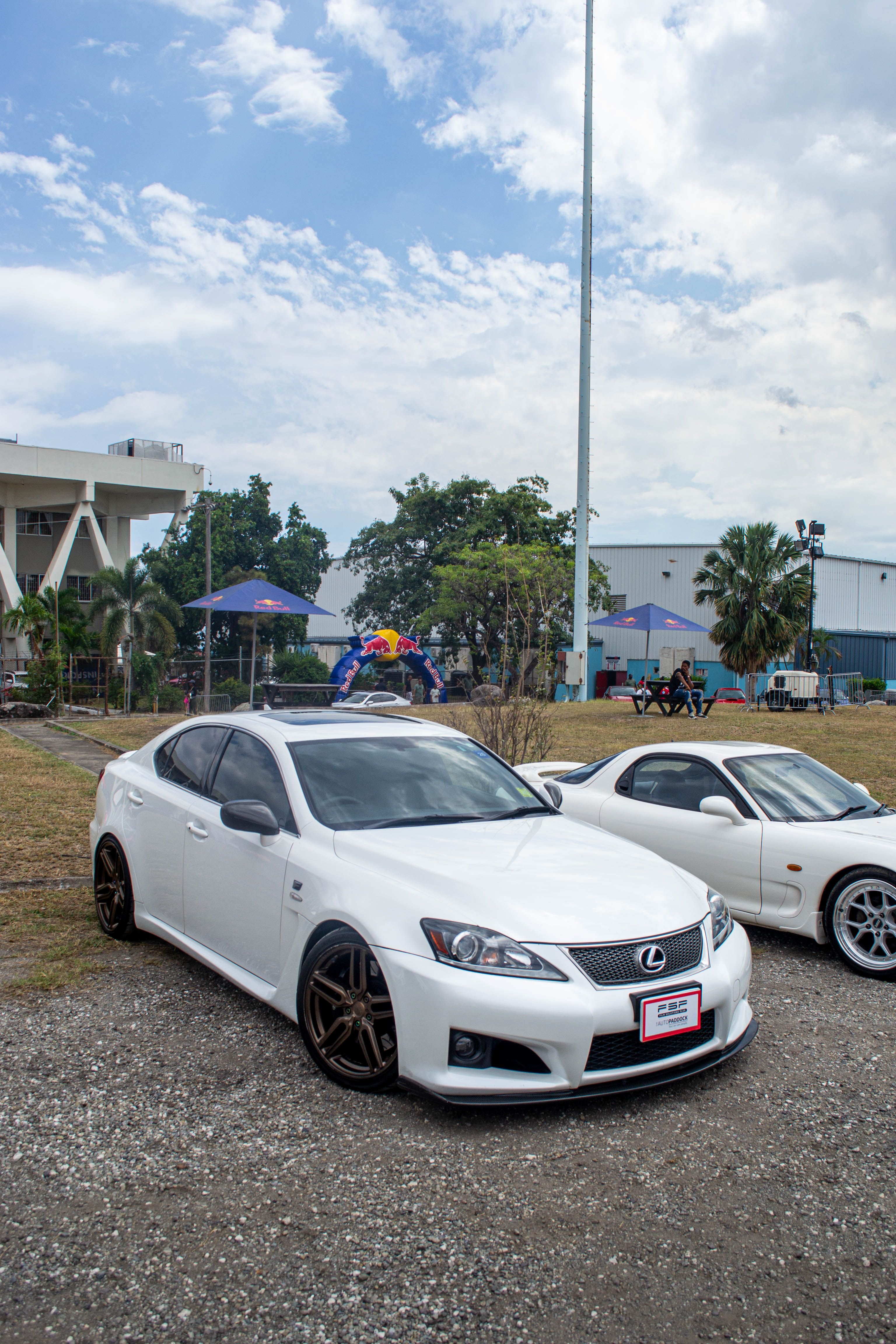 Luxurious Cars Displayed at Outdoor Event in Jamaica · Free Stock Photo