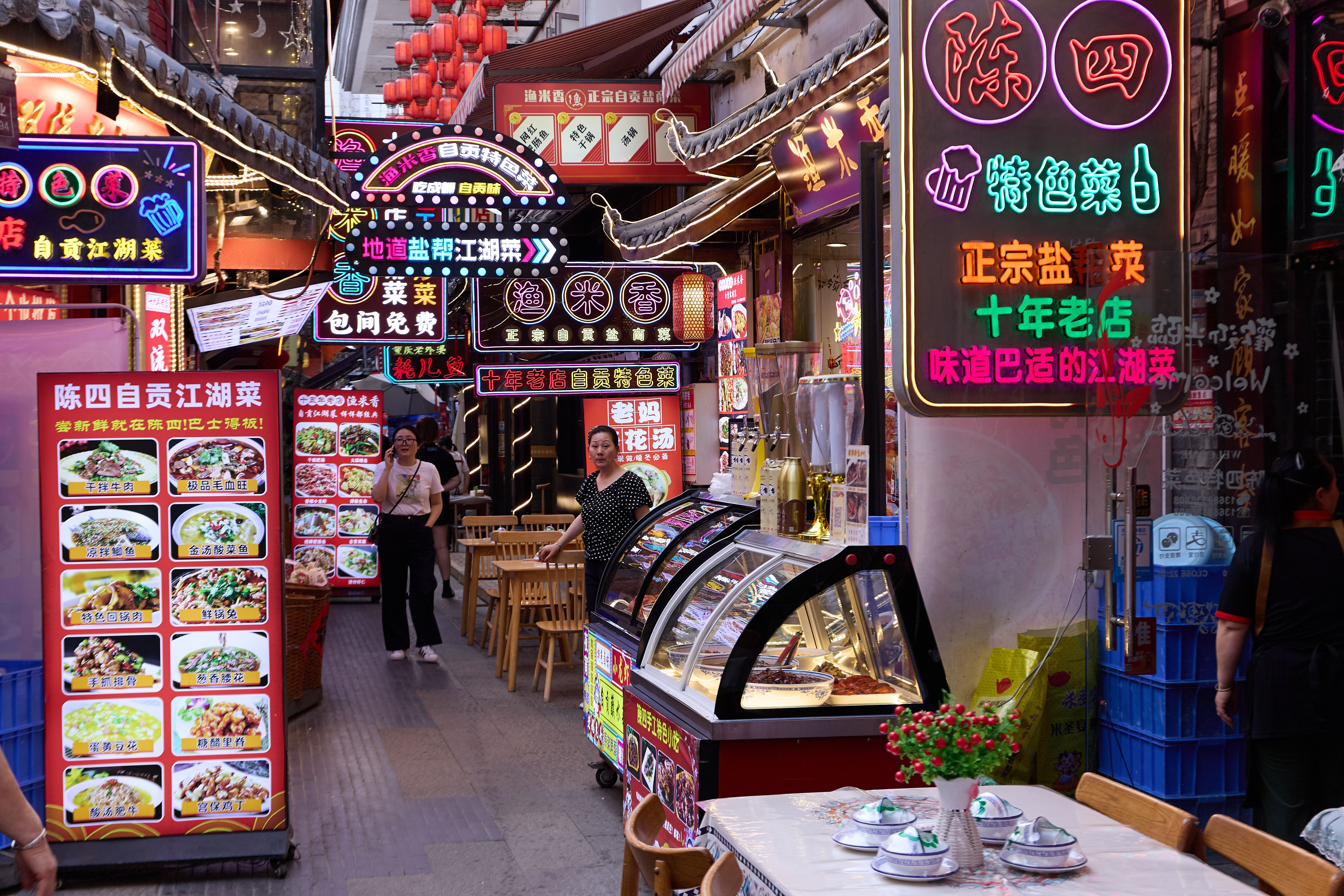 Vibrant Night Market Street with Neon Signs · Free Stock Photo