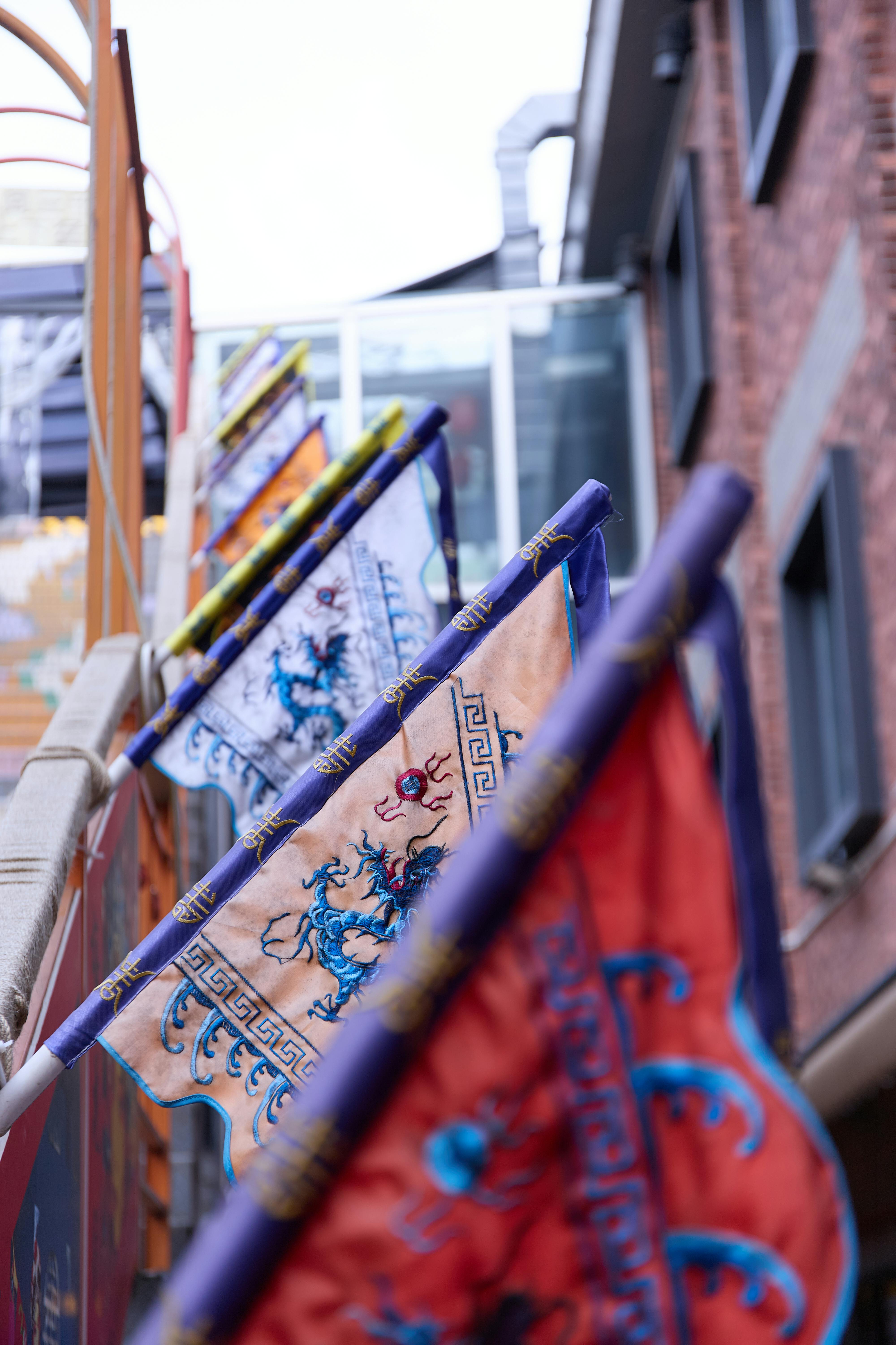Colorful Chinese Dragon Flags in Alleyway · Free Stock Photo
