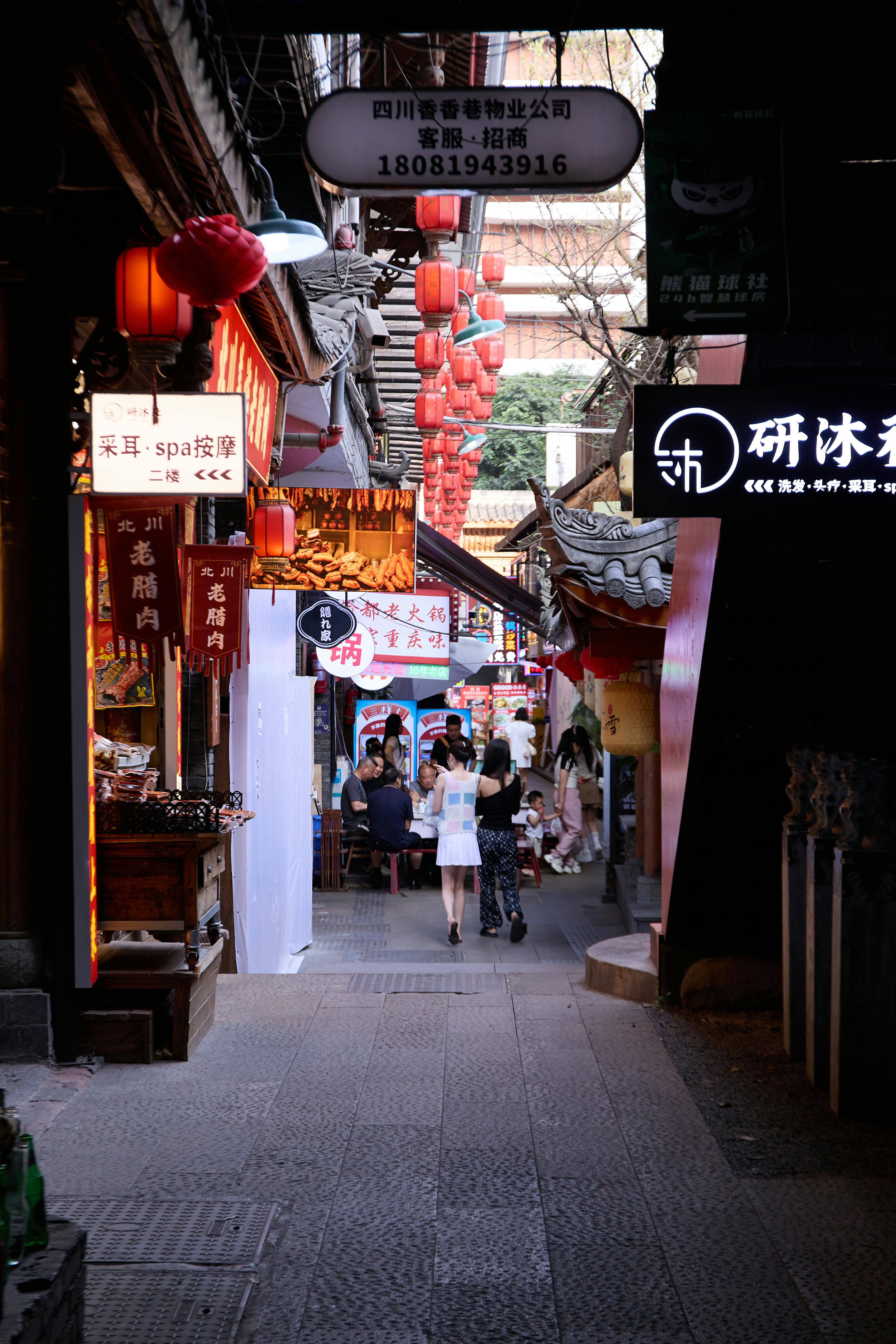 Vibrant Asian Market Alley with Lanterns · Free Stock Photo