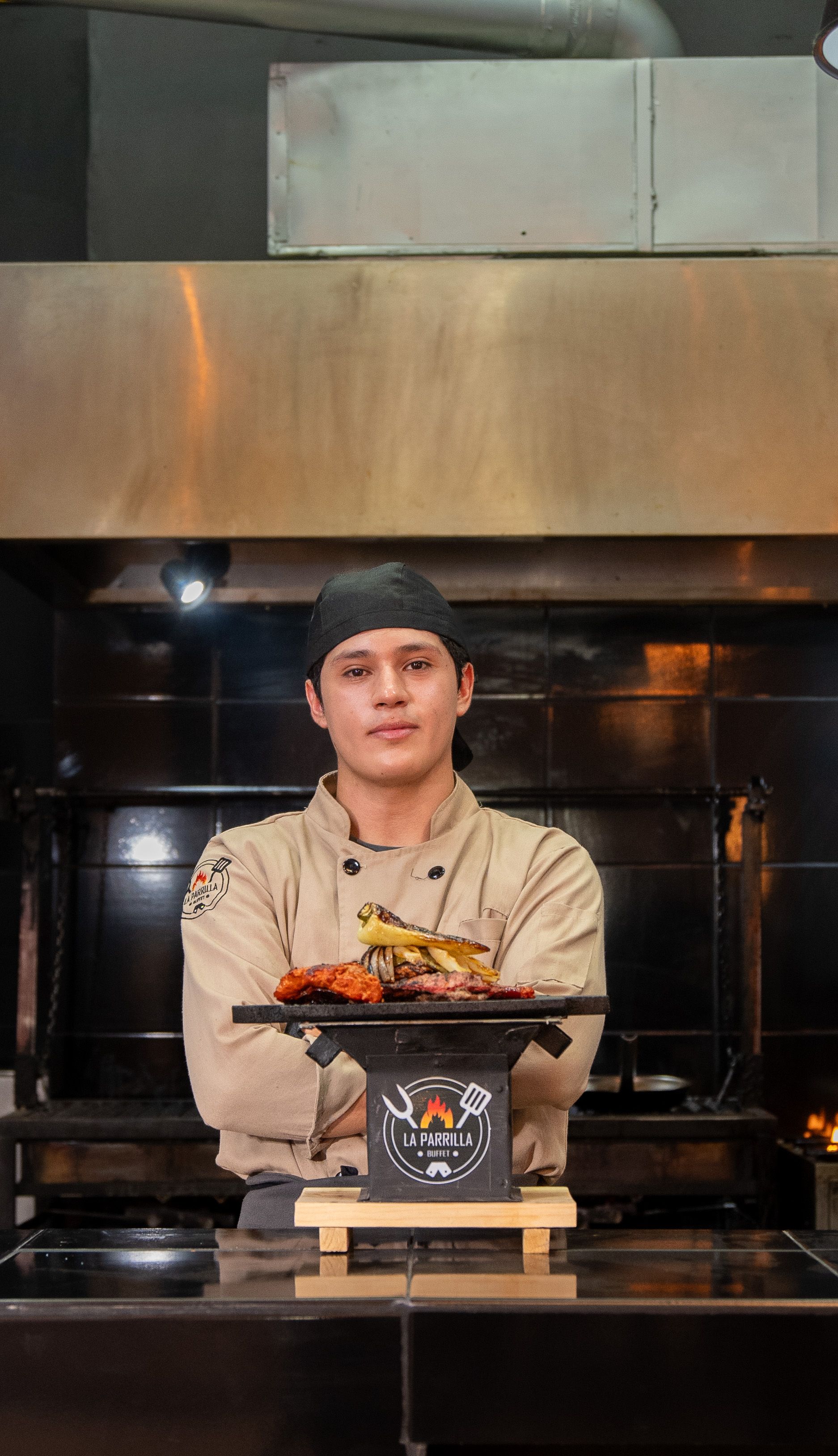 Chef presenting traditional Mexican cuisine in restaurant kitchen ...