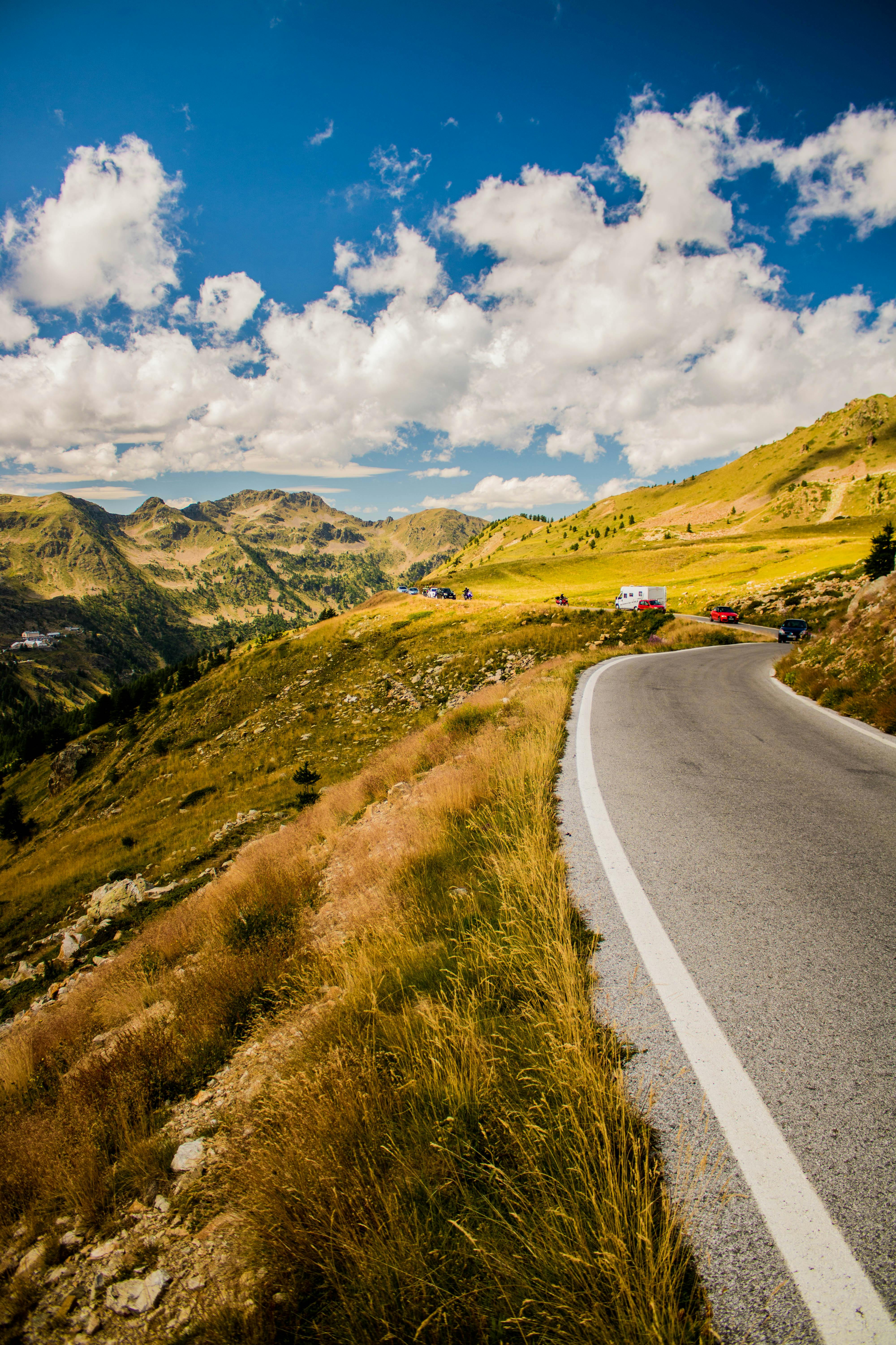 Asphalt Road and Mountain Slope Scenery · Free Stock Photo