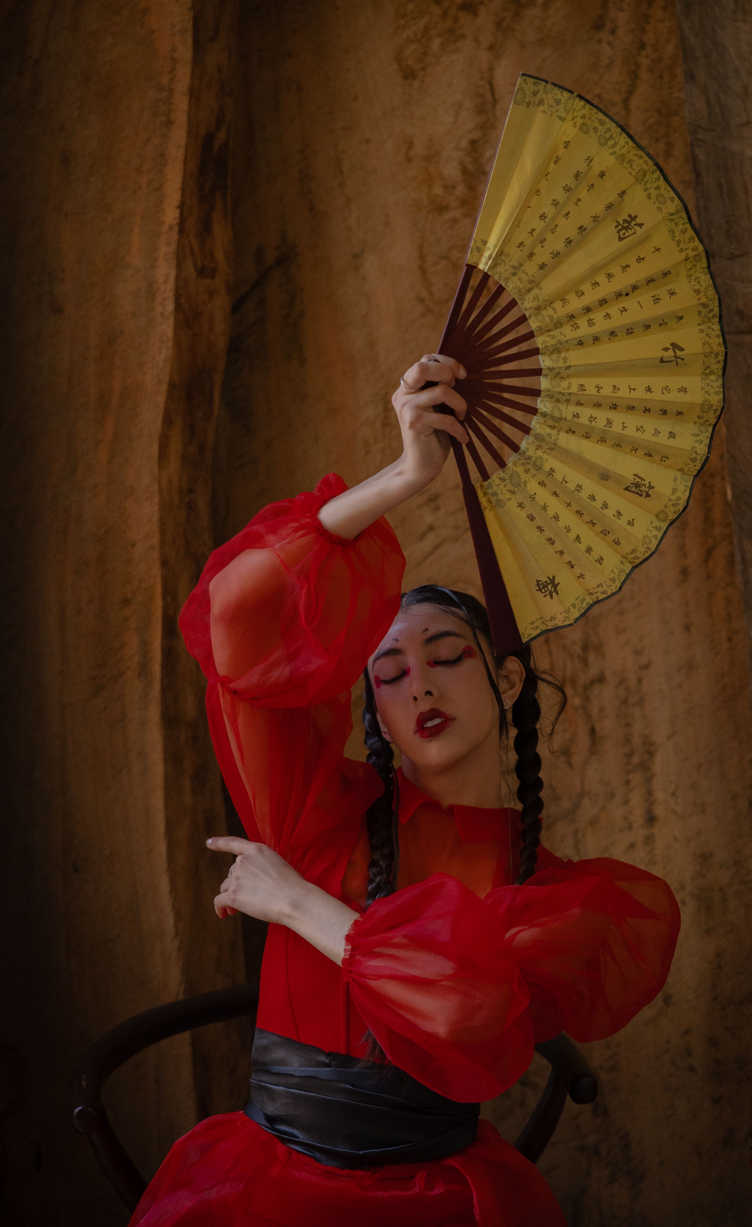 Artistic Portrait of Woman with Fan in Red Dress · Free Stock Photo