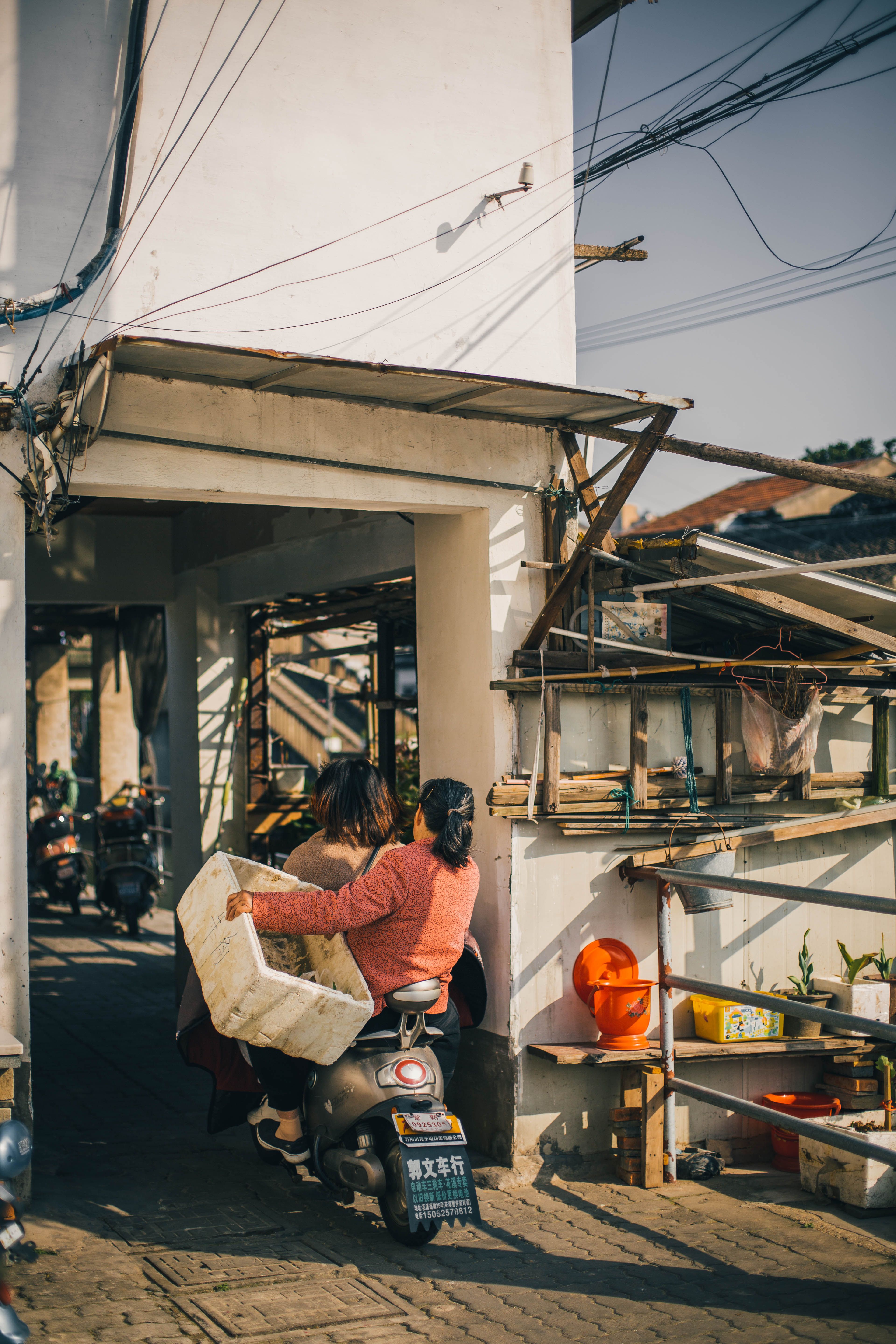 Man Washing Clothes on a Street · Free Stock Photo