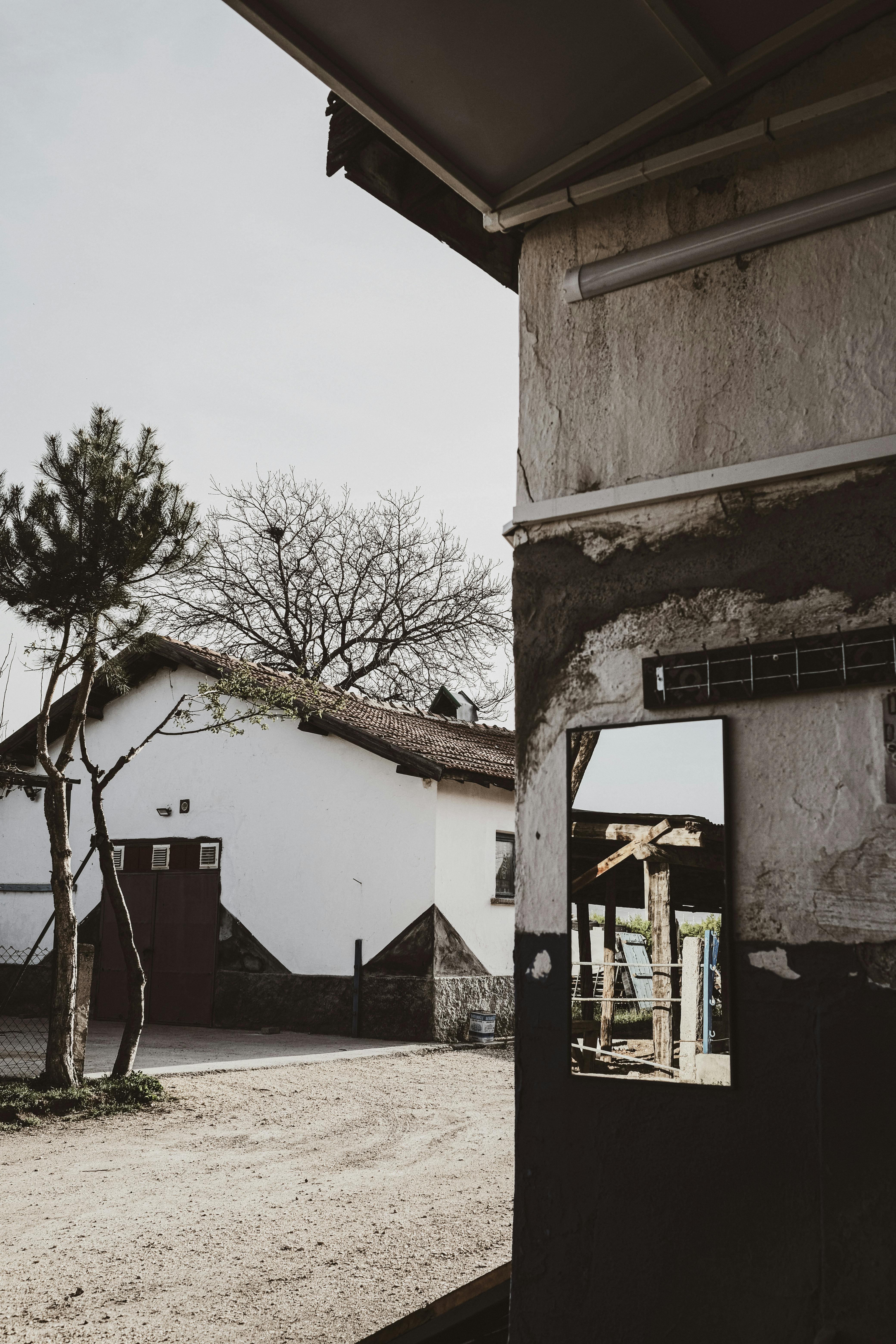 Rustic Farmyard with Vintage Architecture · Free Stock Photo