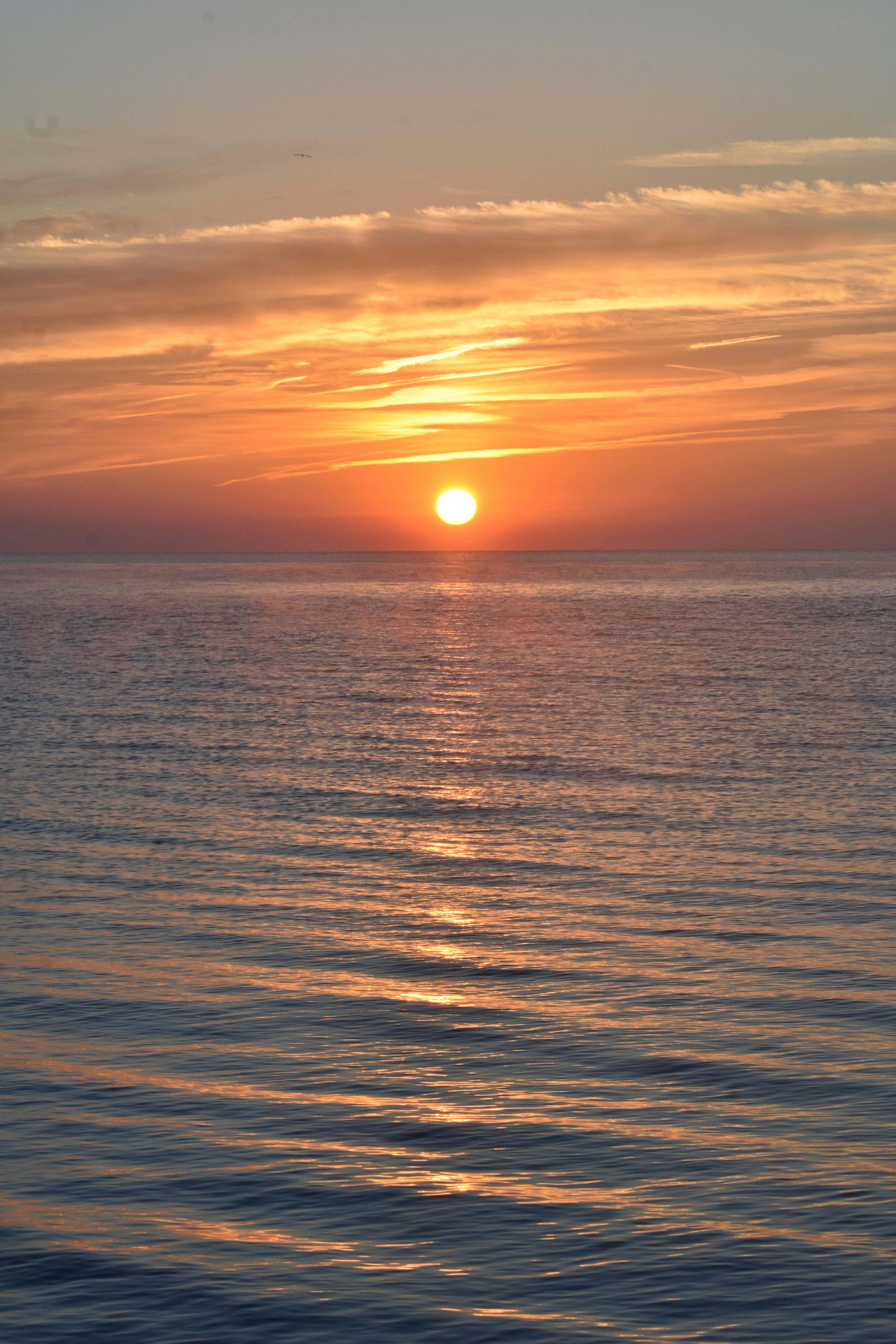 Dramatic Ocean Sunset with Vibrant Sky · Free Stock Photo