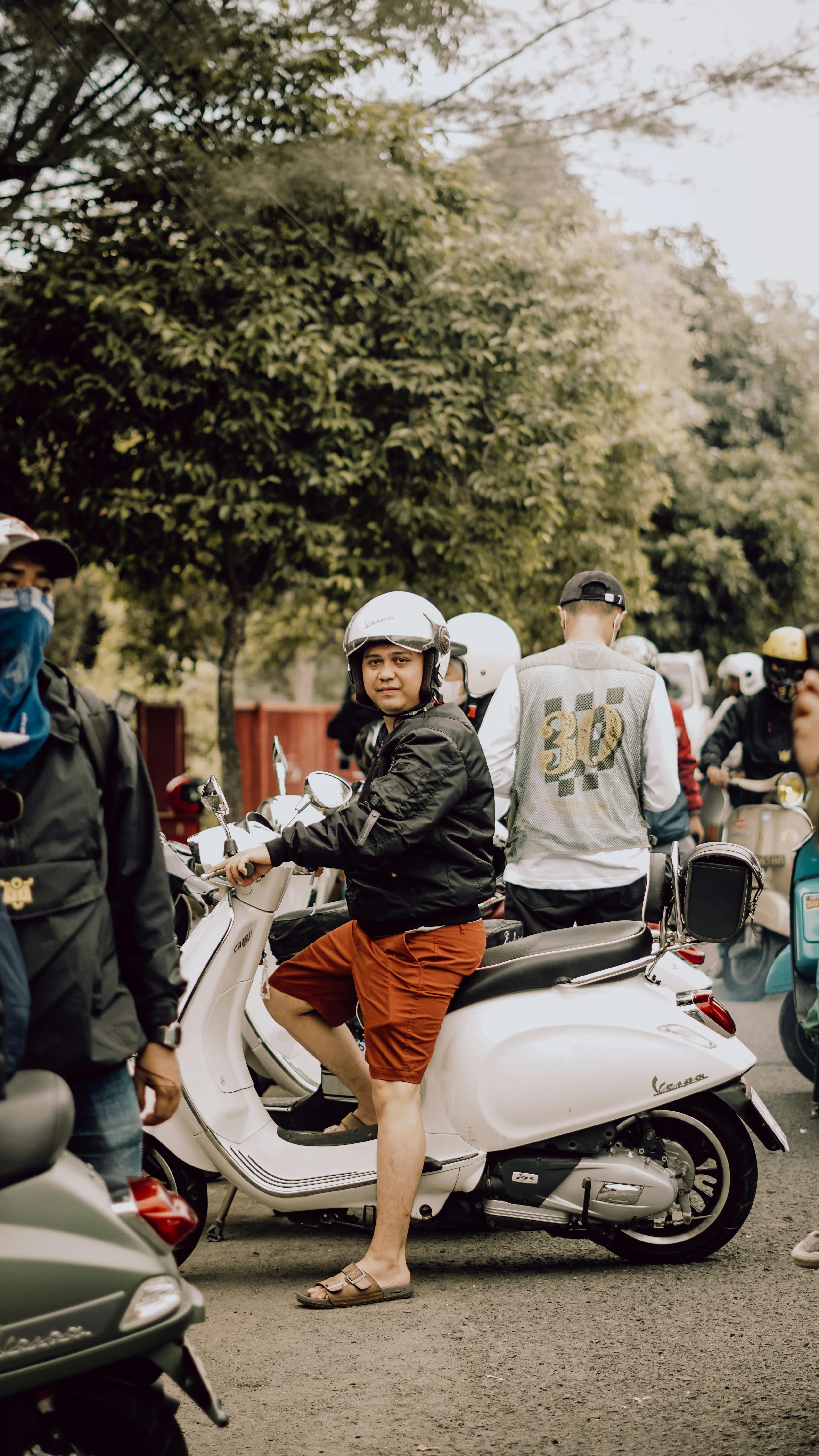 Happy Motorcyclist on Vespa in East Java · Free Stock Photo