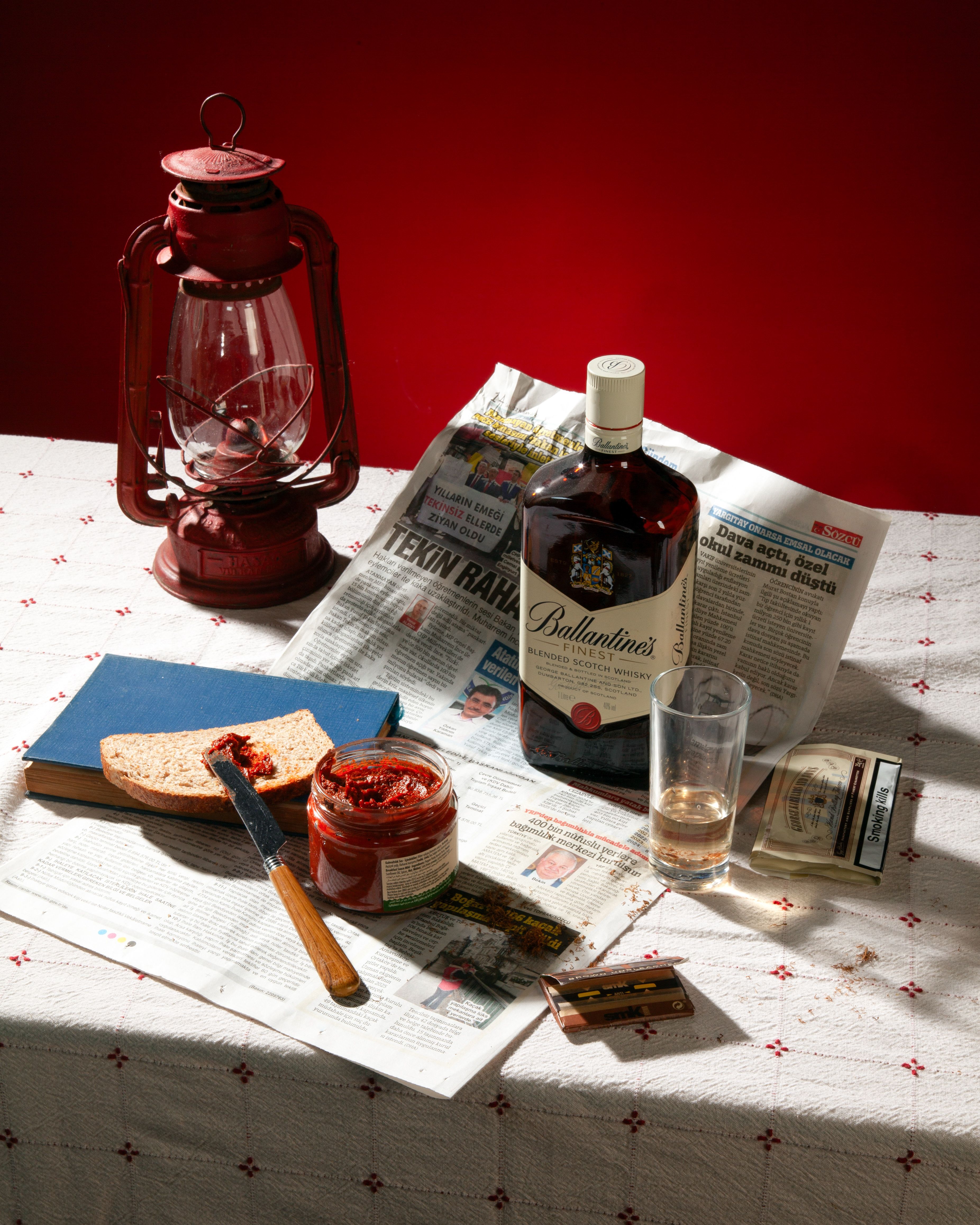 Vintage Still Life with Newspaper and Whiskey · Free Stock Photo