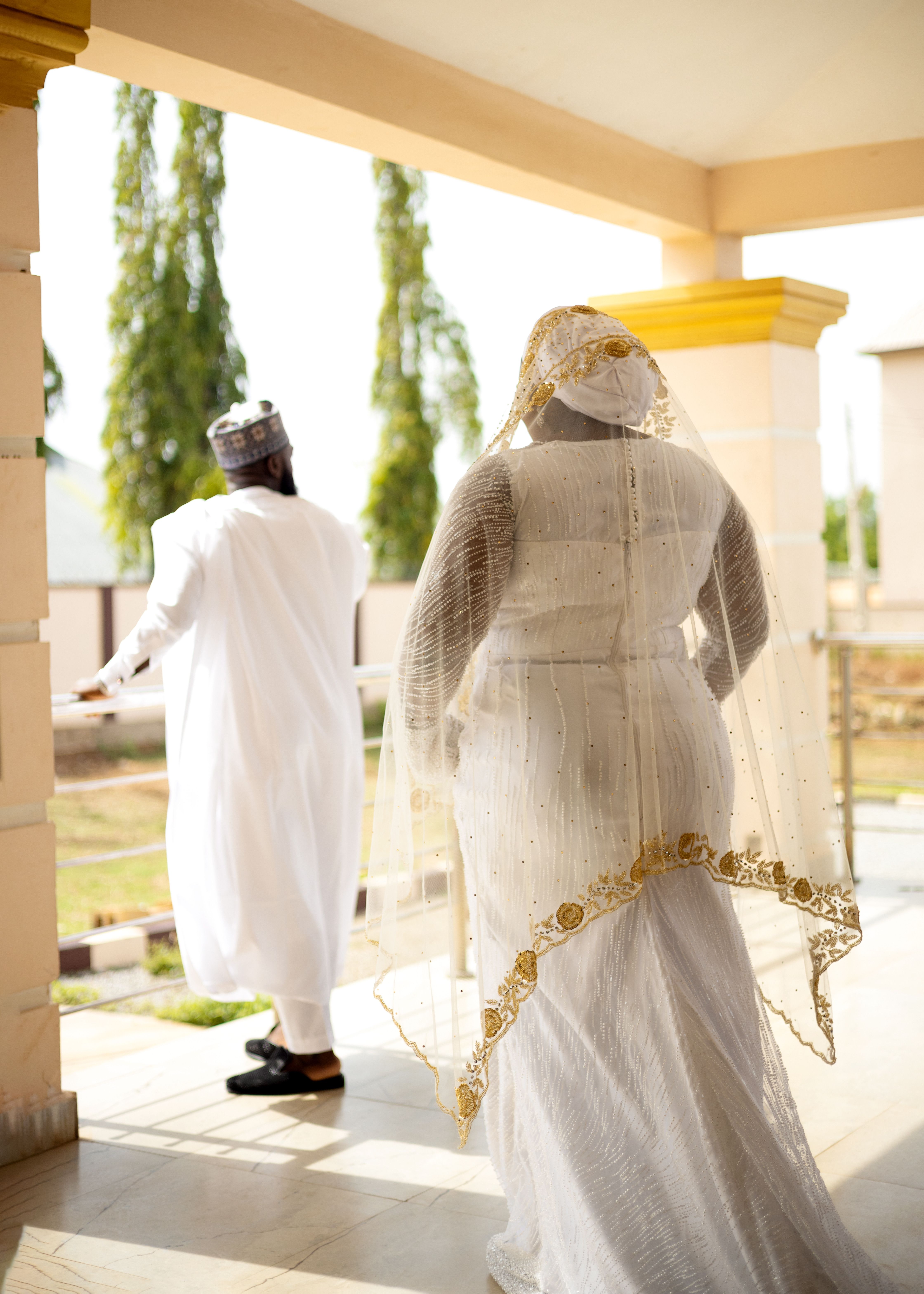 Bride and Groom in Traditional Wedding Attire · Free Stock Photo