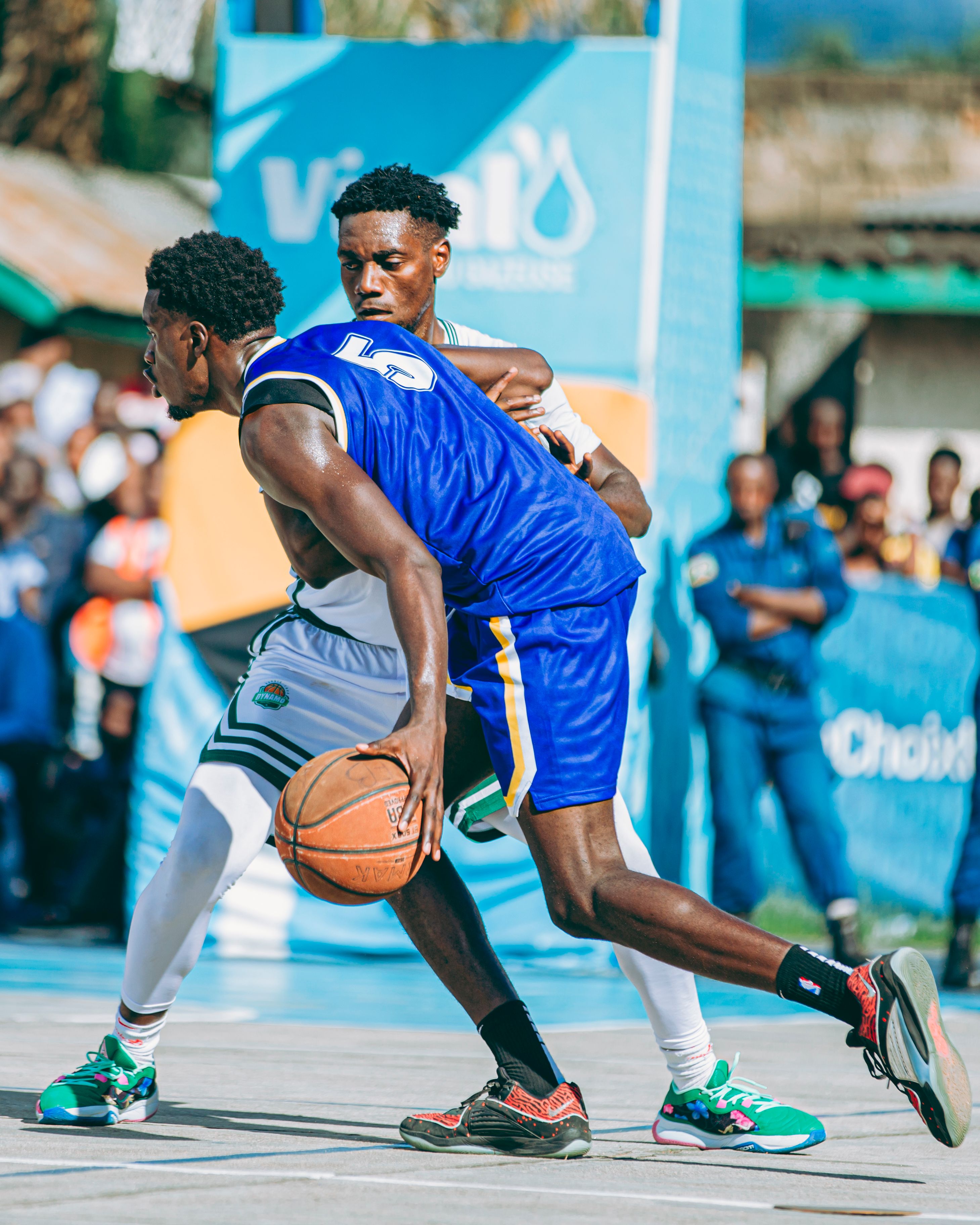 Dynamic Outdoor Street Basketball Game Action · Free Stock Photo