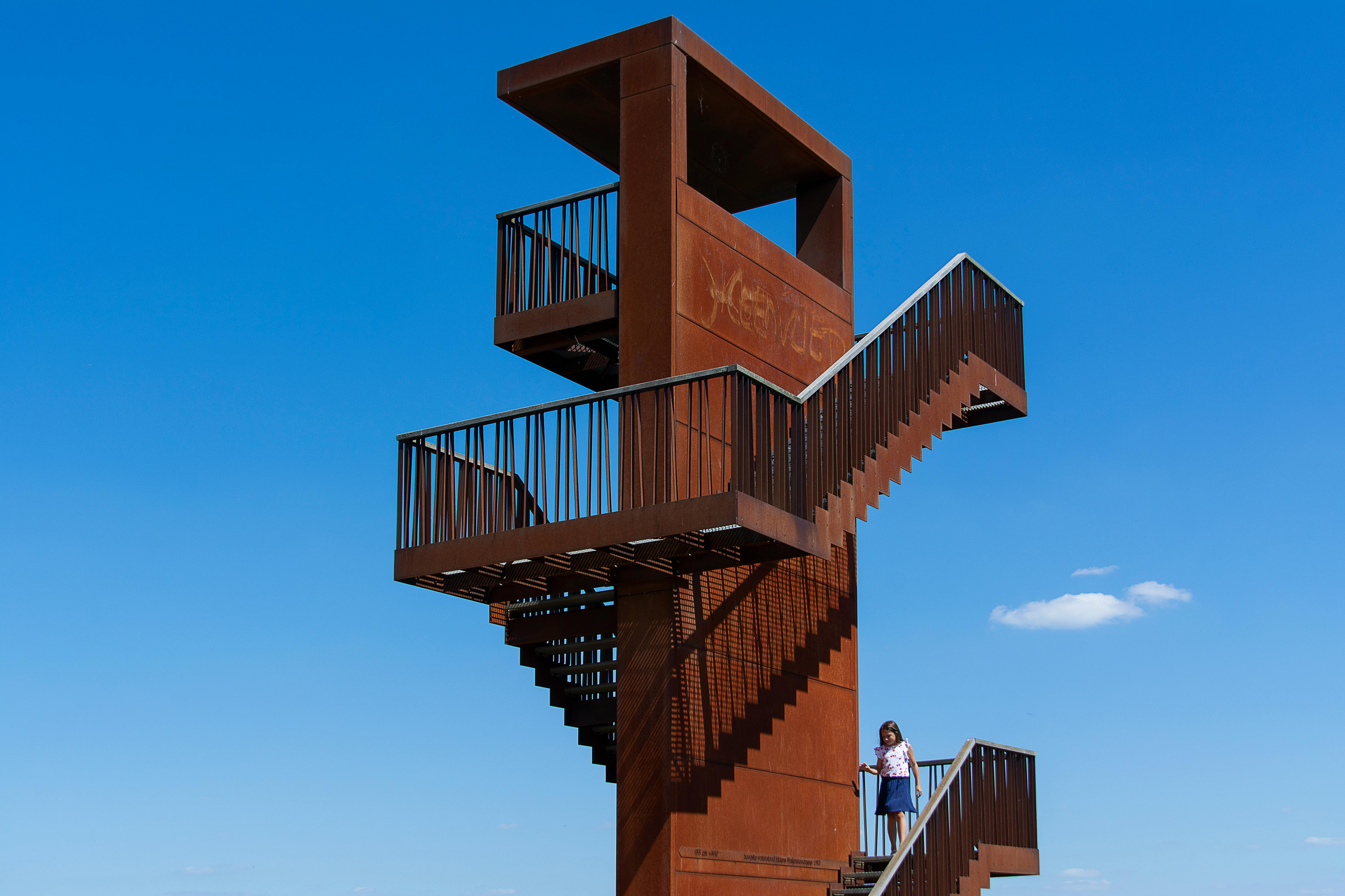Modern Industrial Watchtower Against Blue Sky · Free Stock Photo