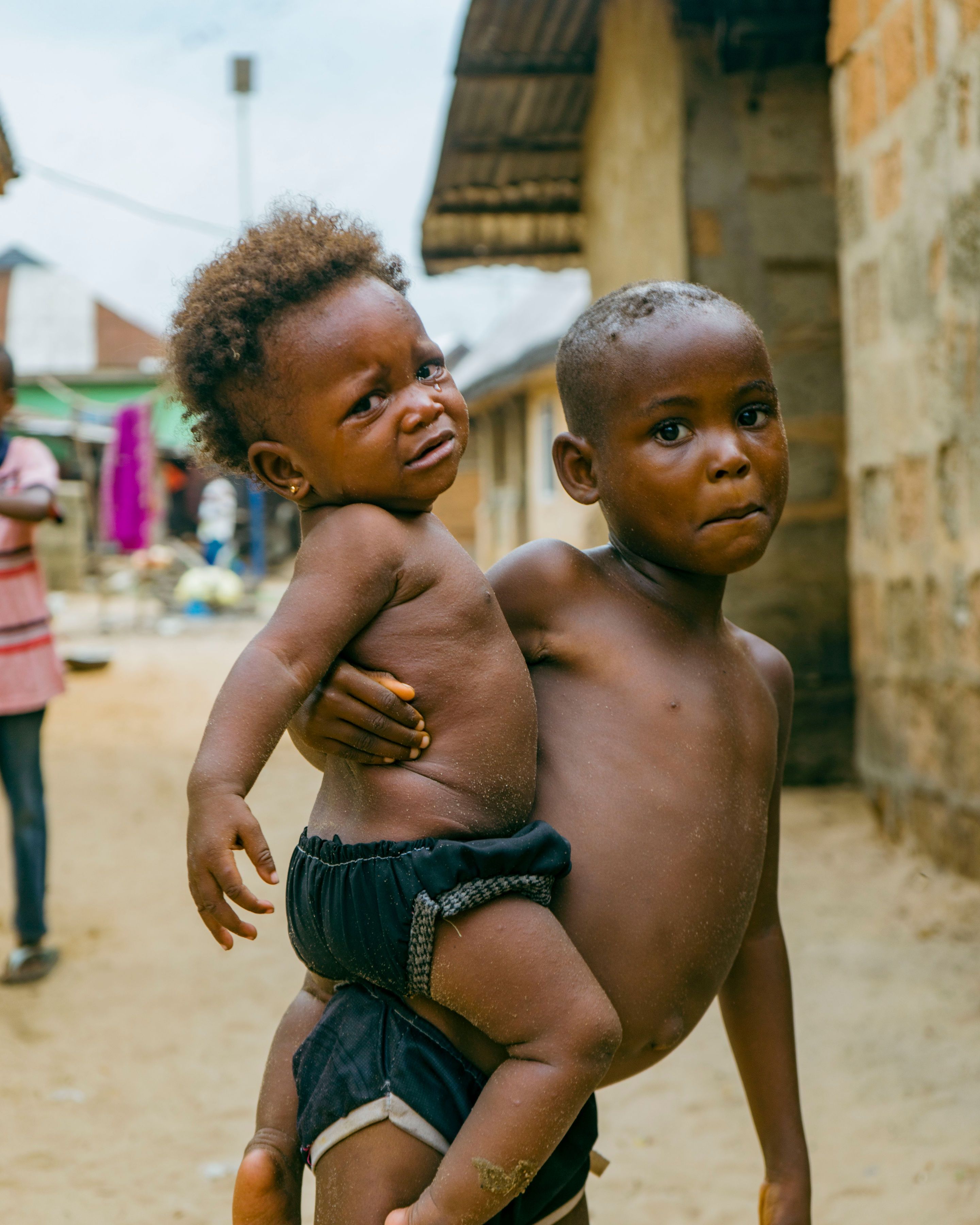 Children Playing Outdoors in African Village · Free Stock Photo