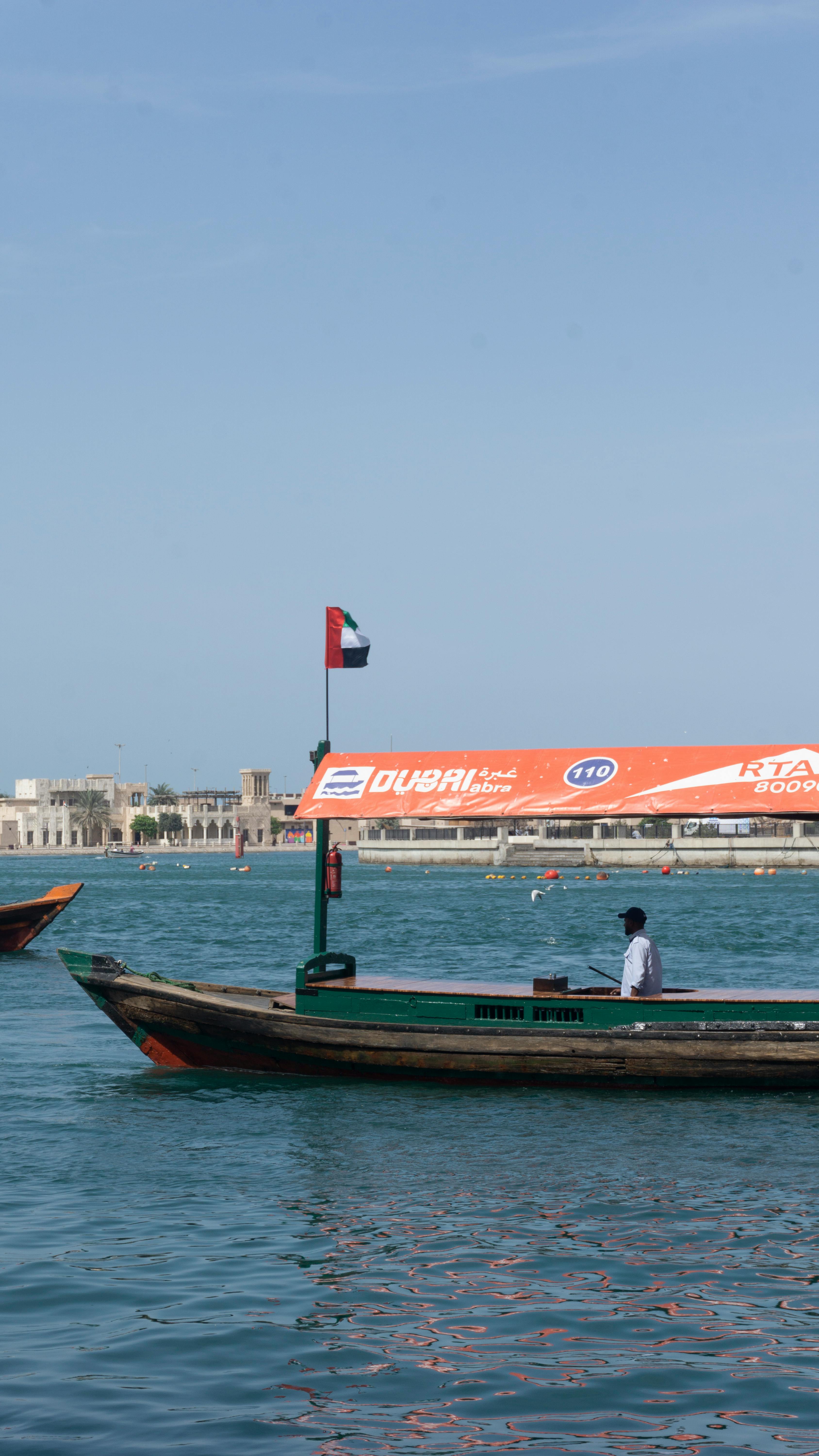 Traditional Abra Ride Across Dubai Creek · Free Stock Photo