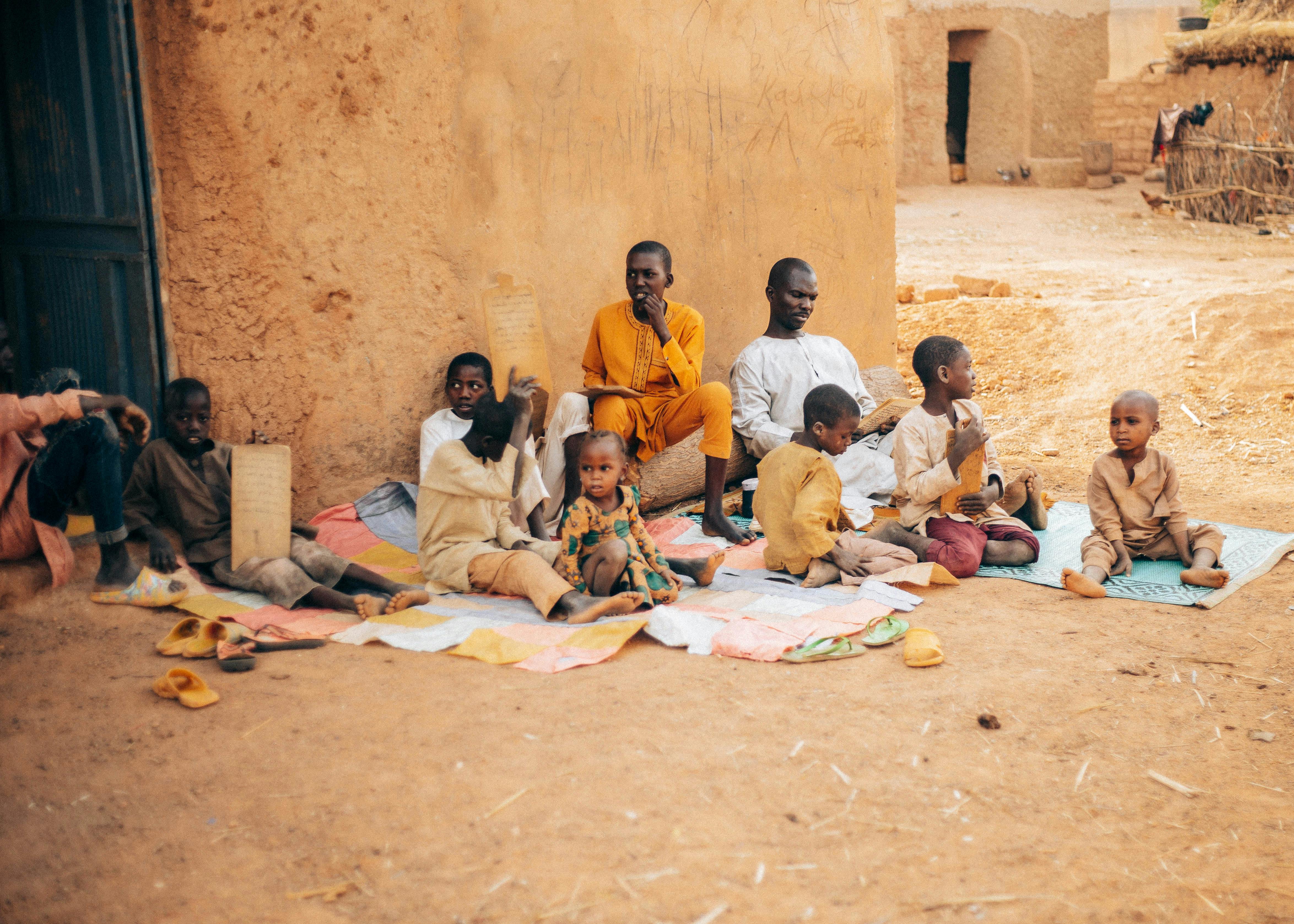 African children studying outdoors in rural setting · Free Stock Photo