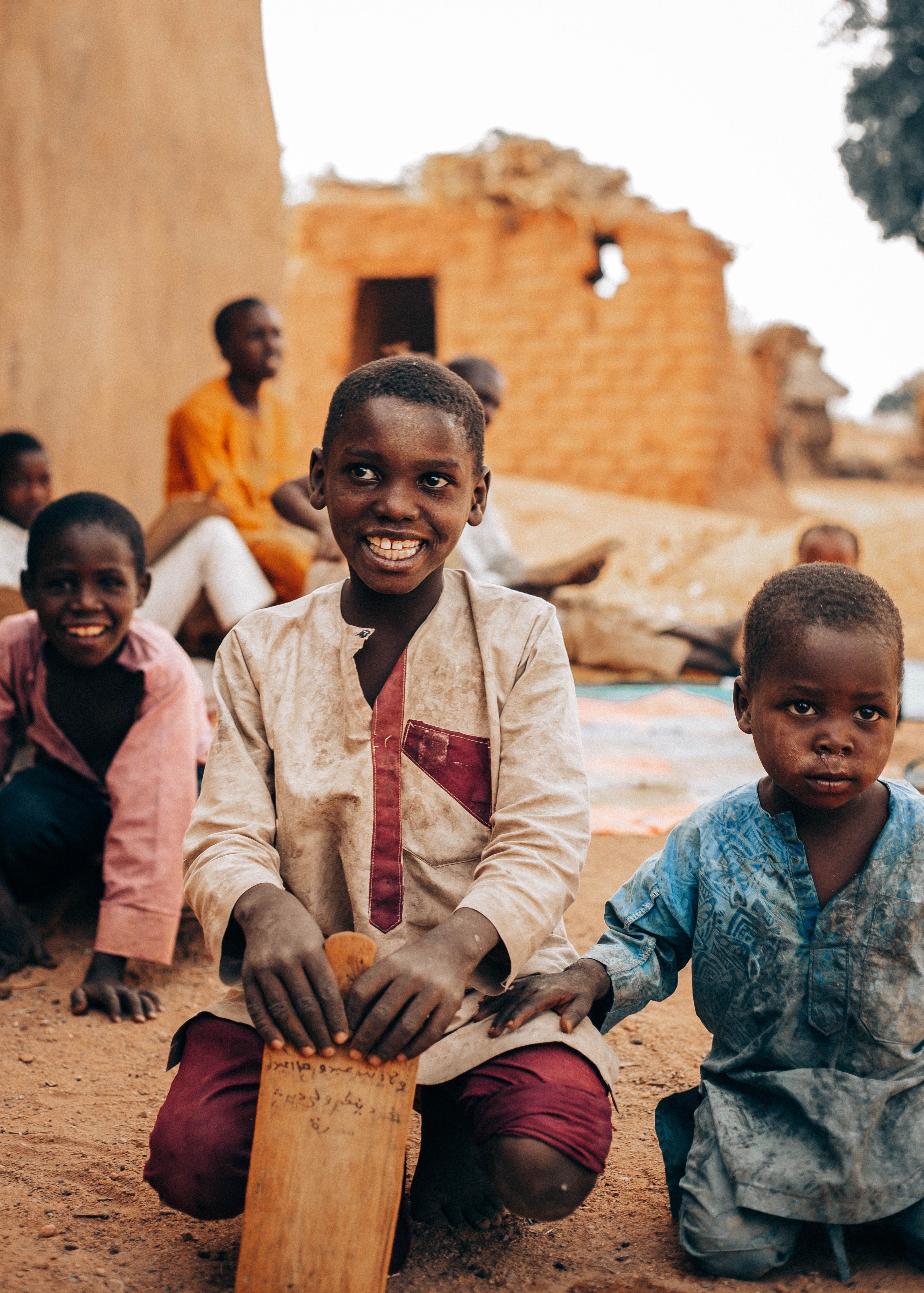 Joyful Children Playing Outdoors in Village · Free Stock Photo