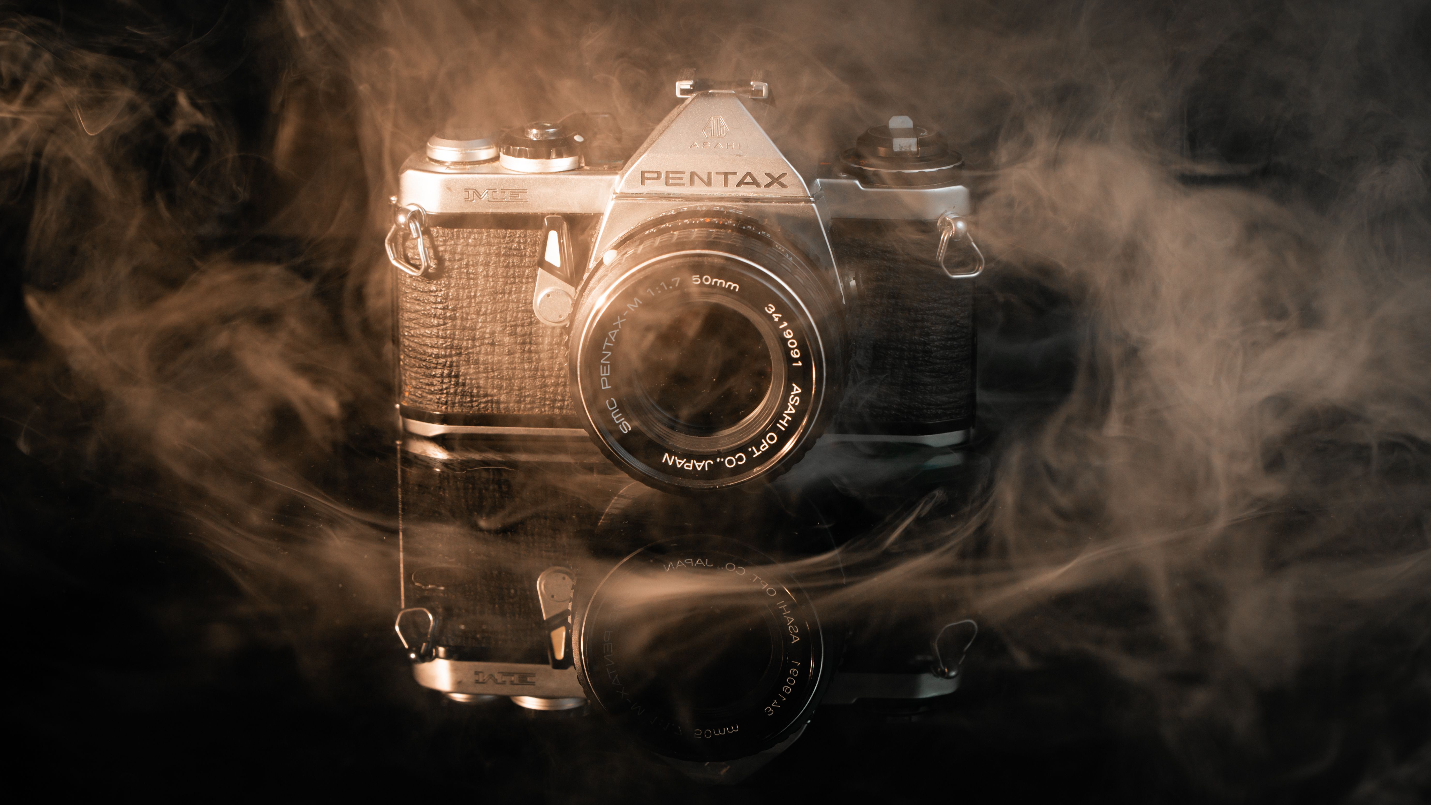 Vintage Pentax Camera with Dramatic Smoke Effect · Free Stock Photo