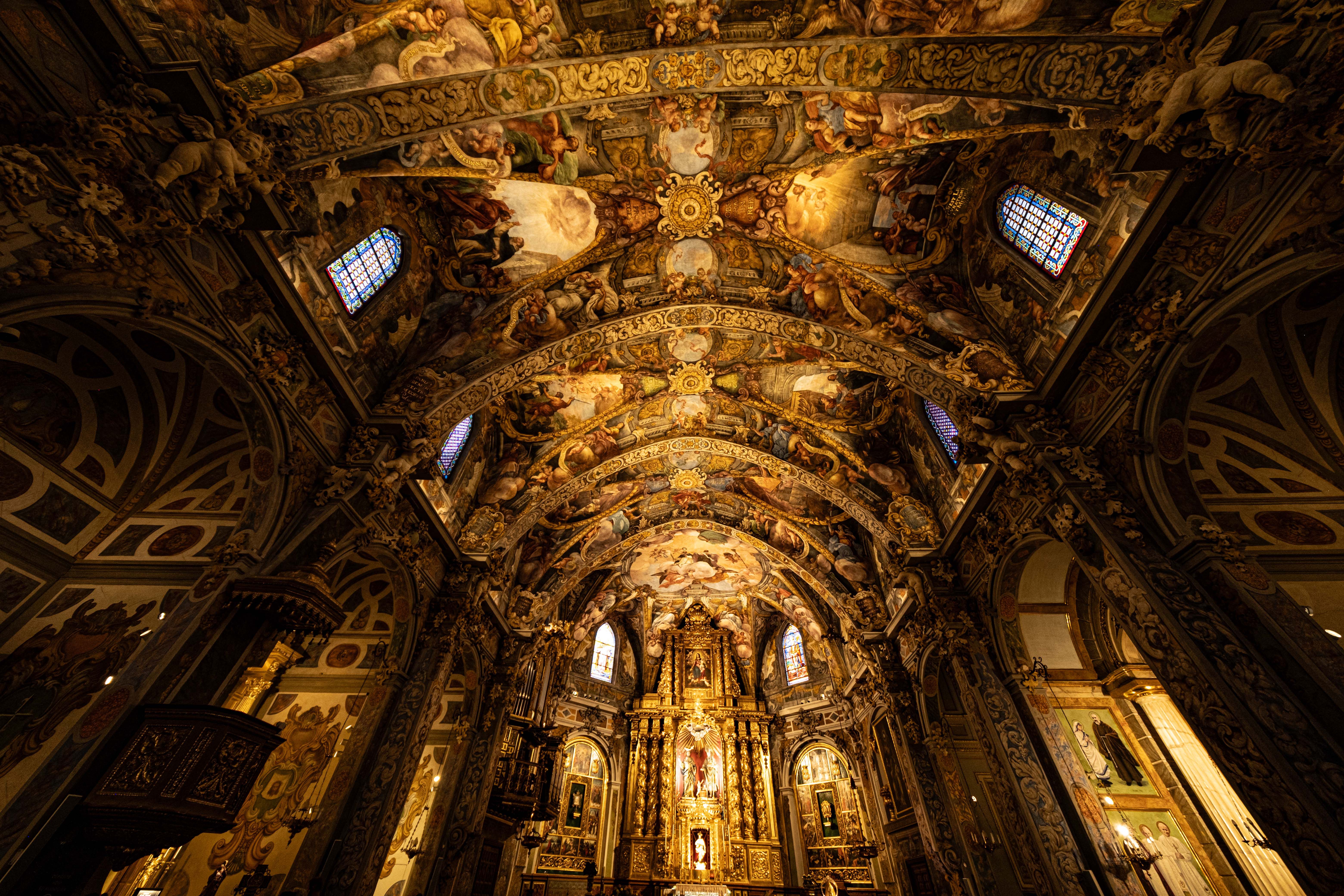 Ornate Baroque Church Interior with Frescoes · Free Stock Photo