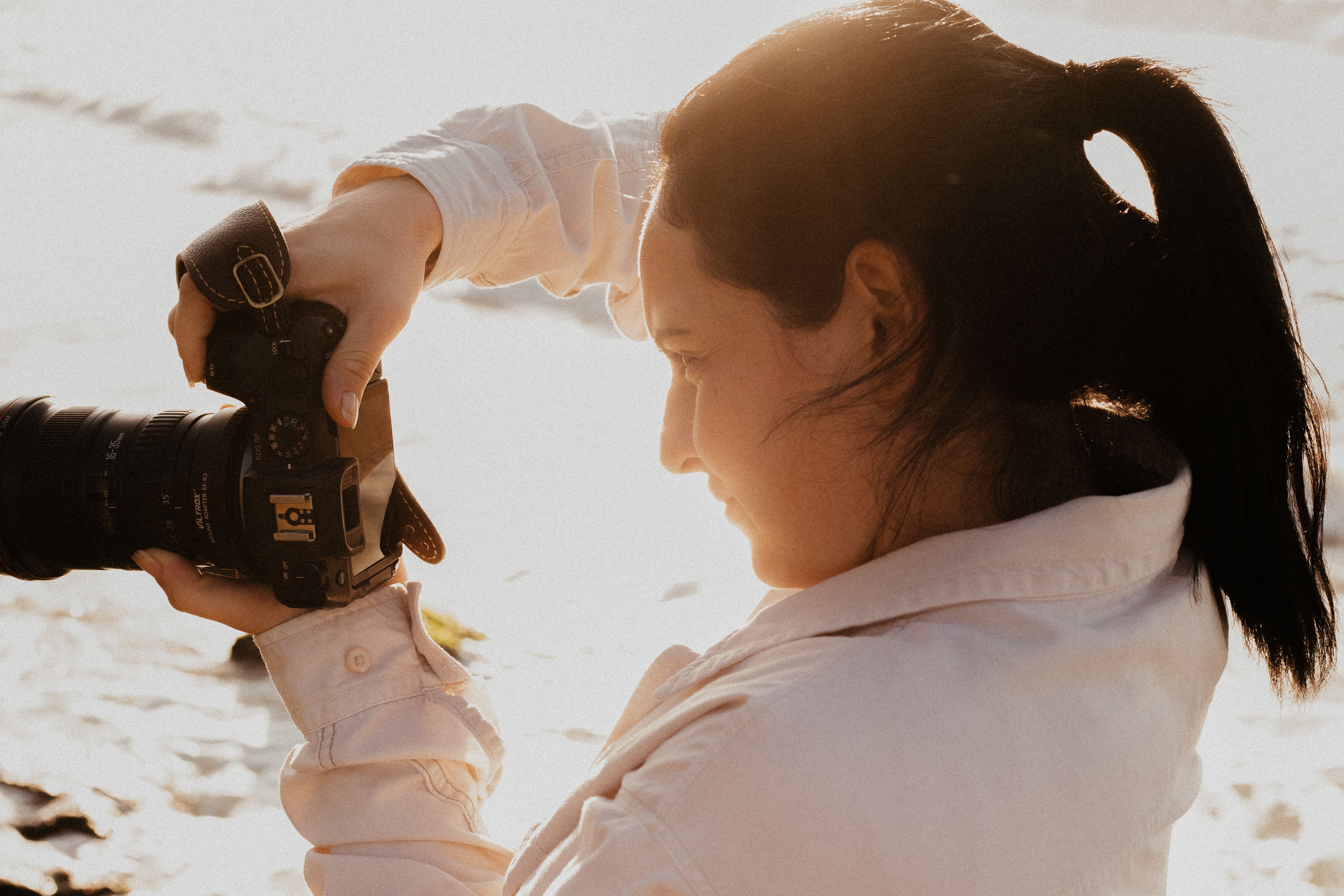 Female Photographer Capturing the Outdoors · Free Stock Photo