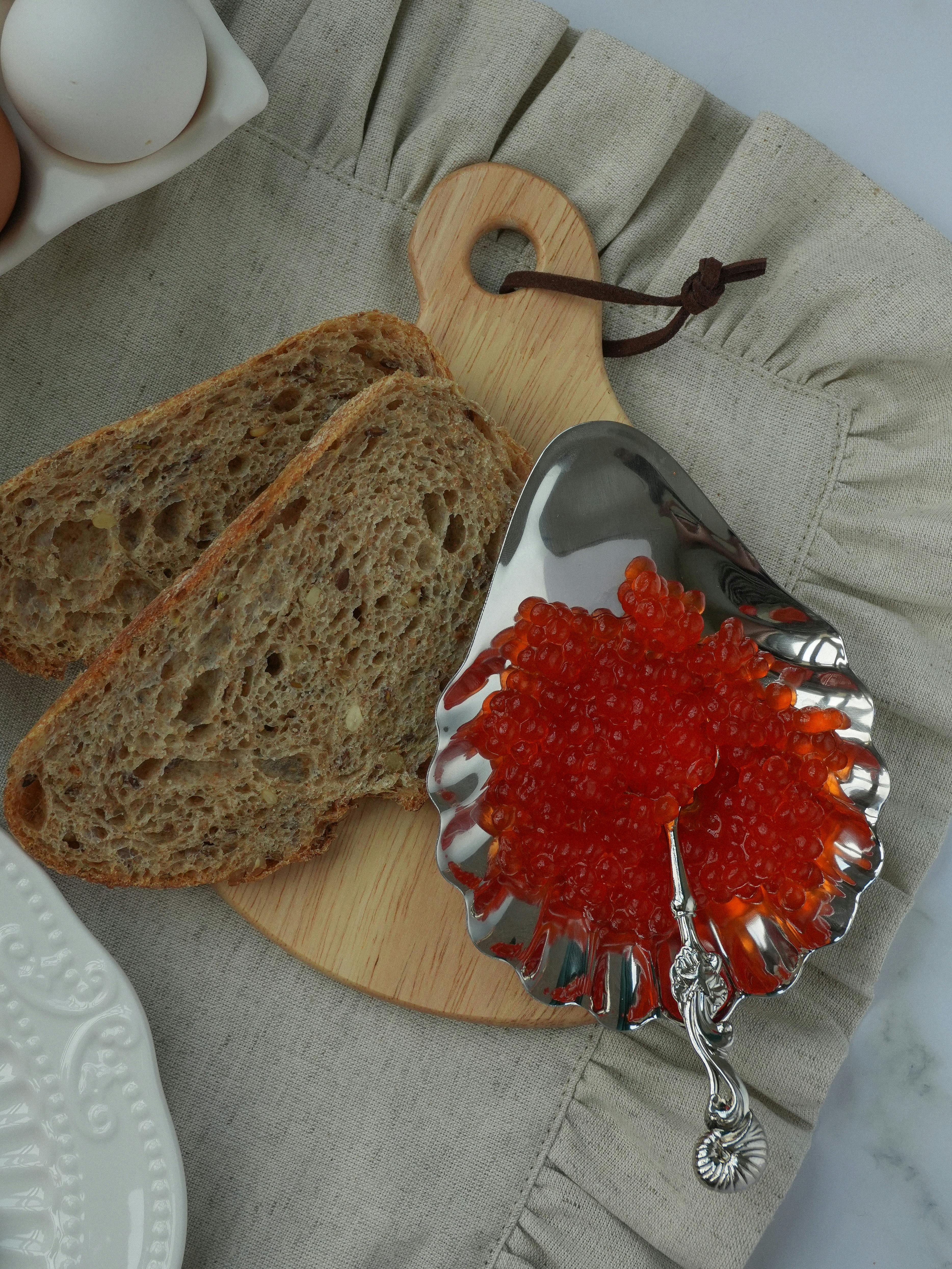 Artistic Close-up of Rustic Bread with Red Caviar · Free Stock Photo