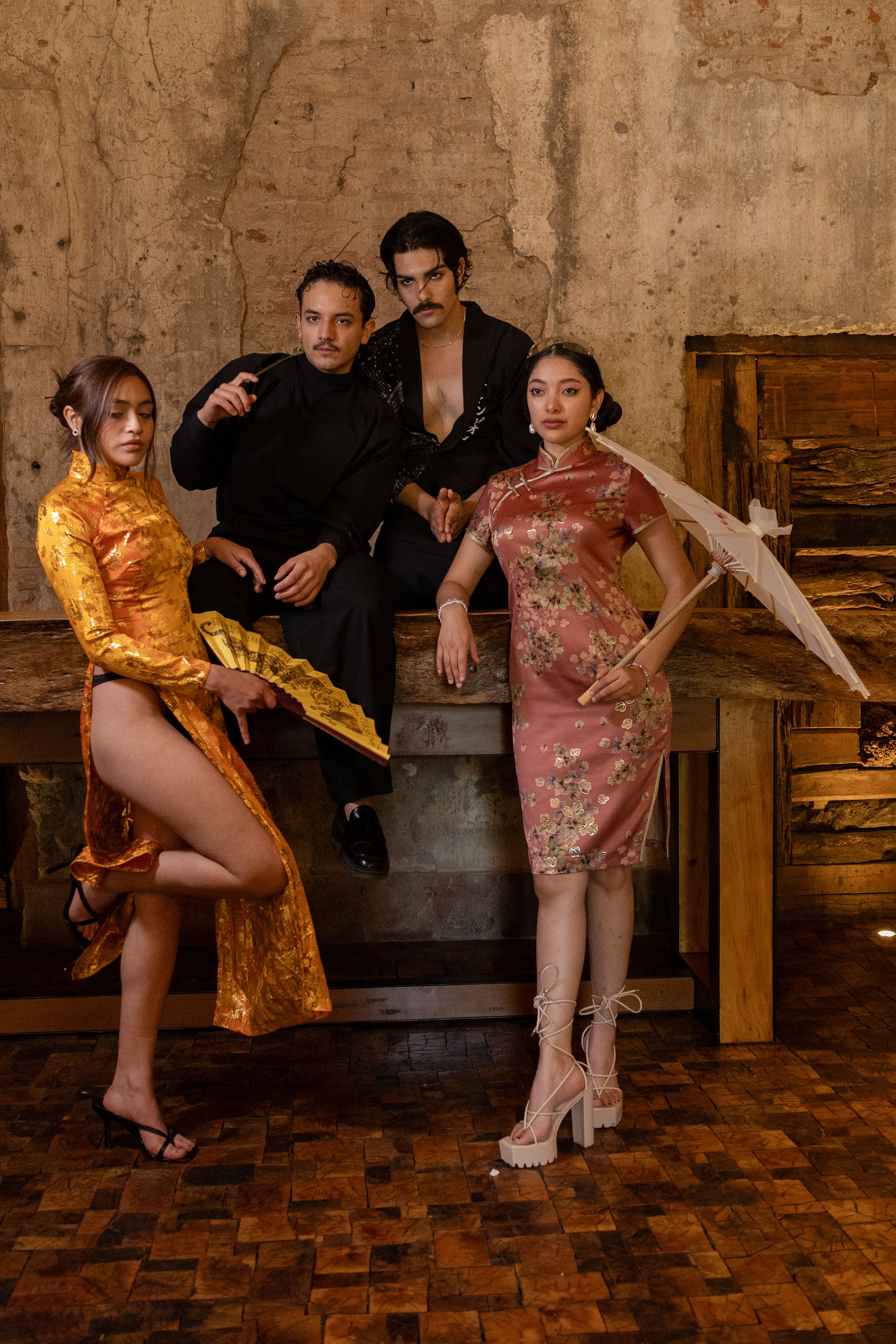 Stylish Group in Elegant Asian-Inspired Attire · Free Stock Photo