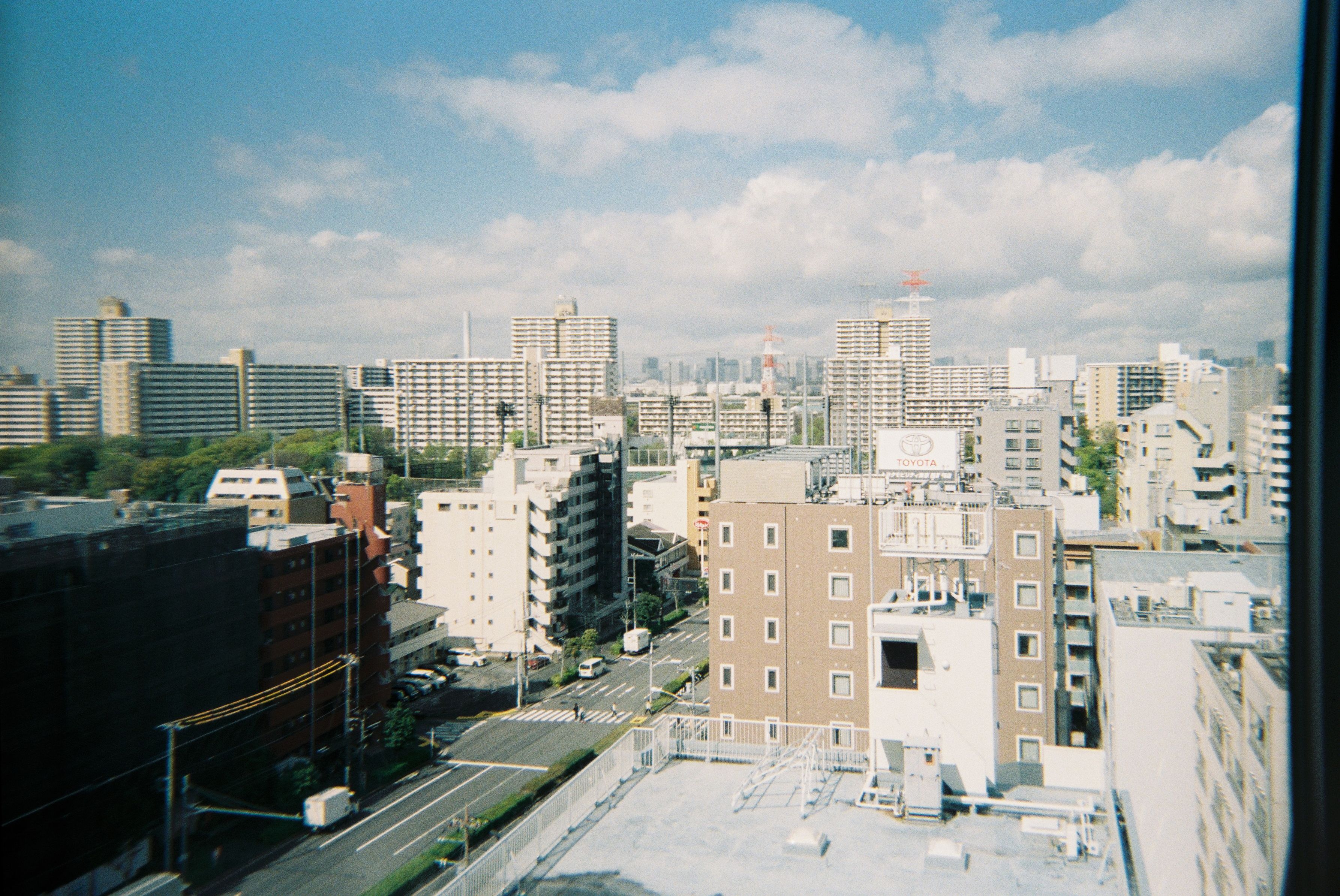 Aerial View of Urban Cityscape on a Sunny Day · Free Stock Photo