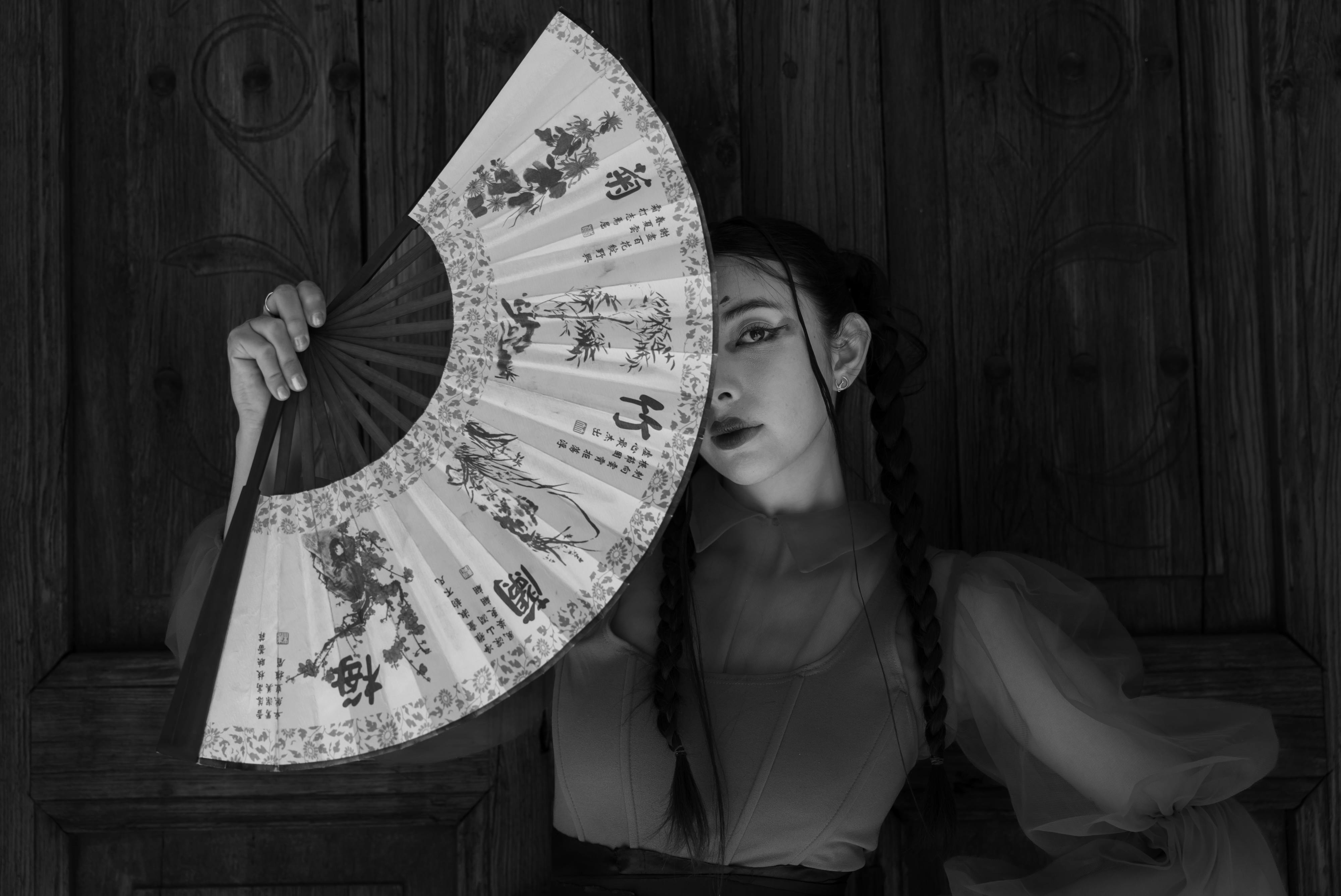 Artistic Portrait with Decorative Hand Fan · Free Stock Photo
