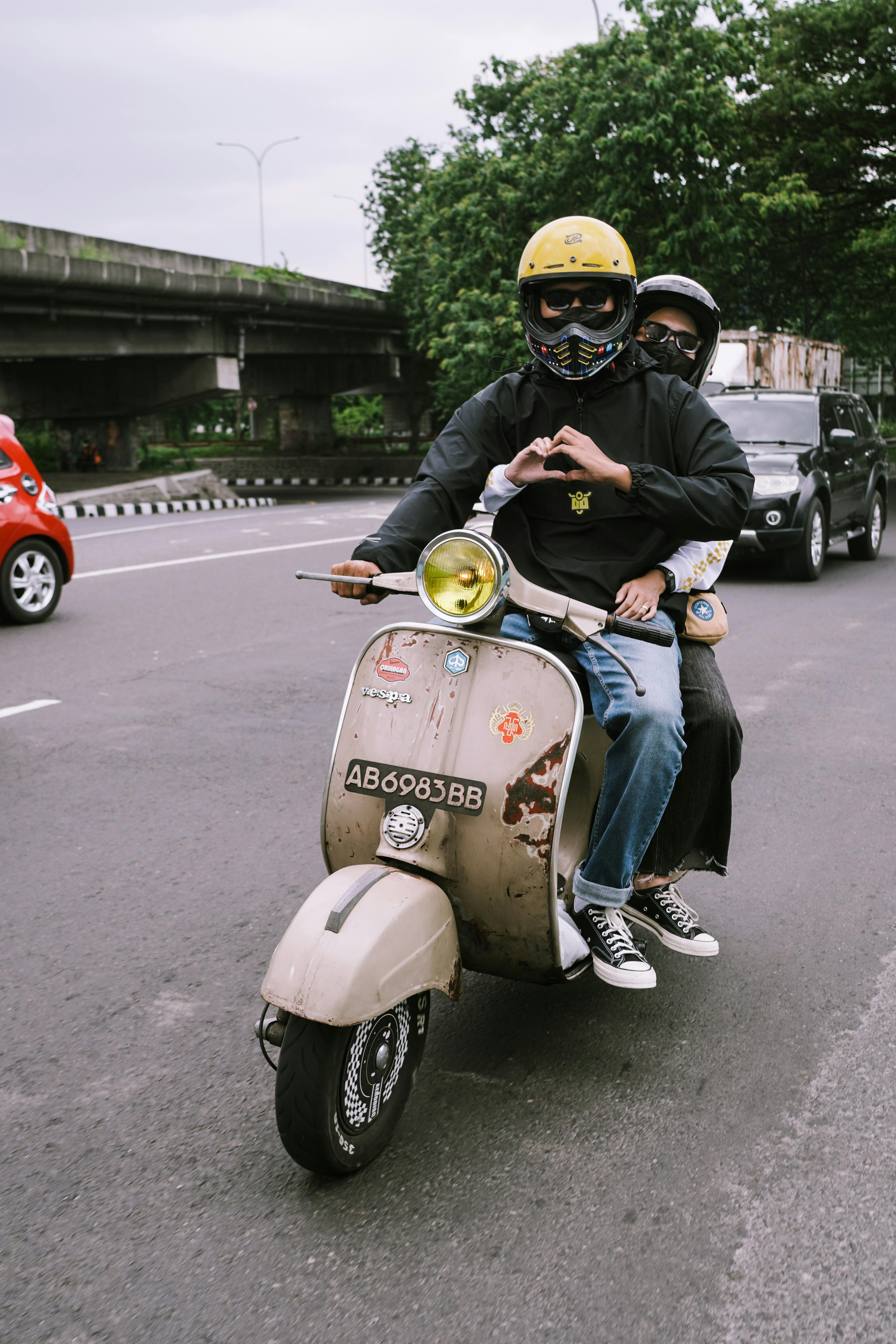 Couple Riding Vintage Scooter in East Java · Free Stock Photo