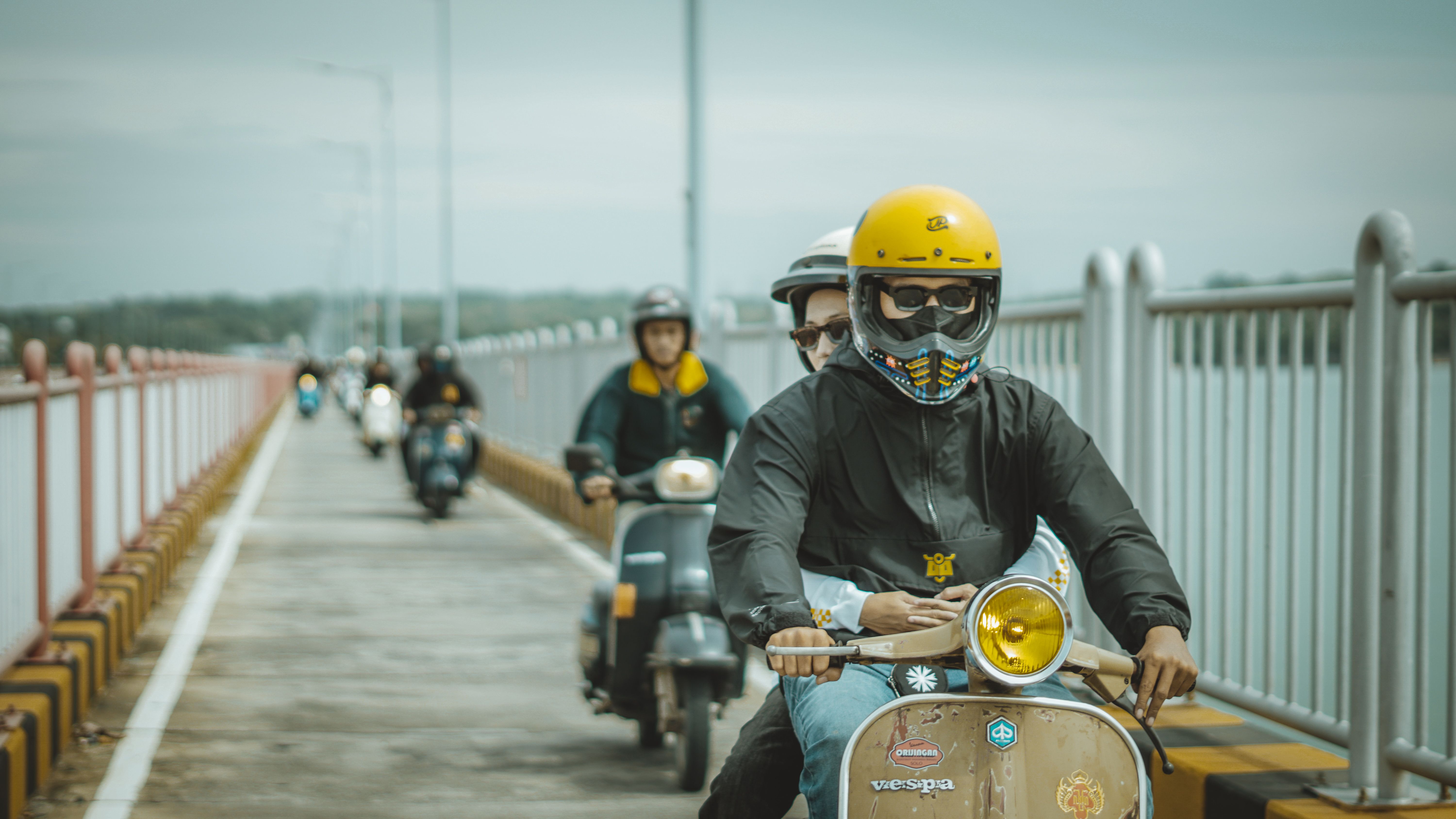 Group Riding Vespas on Bridge in East Java · Free Stock Photo