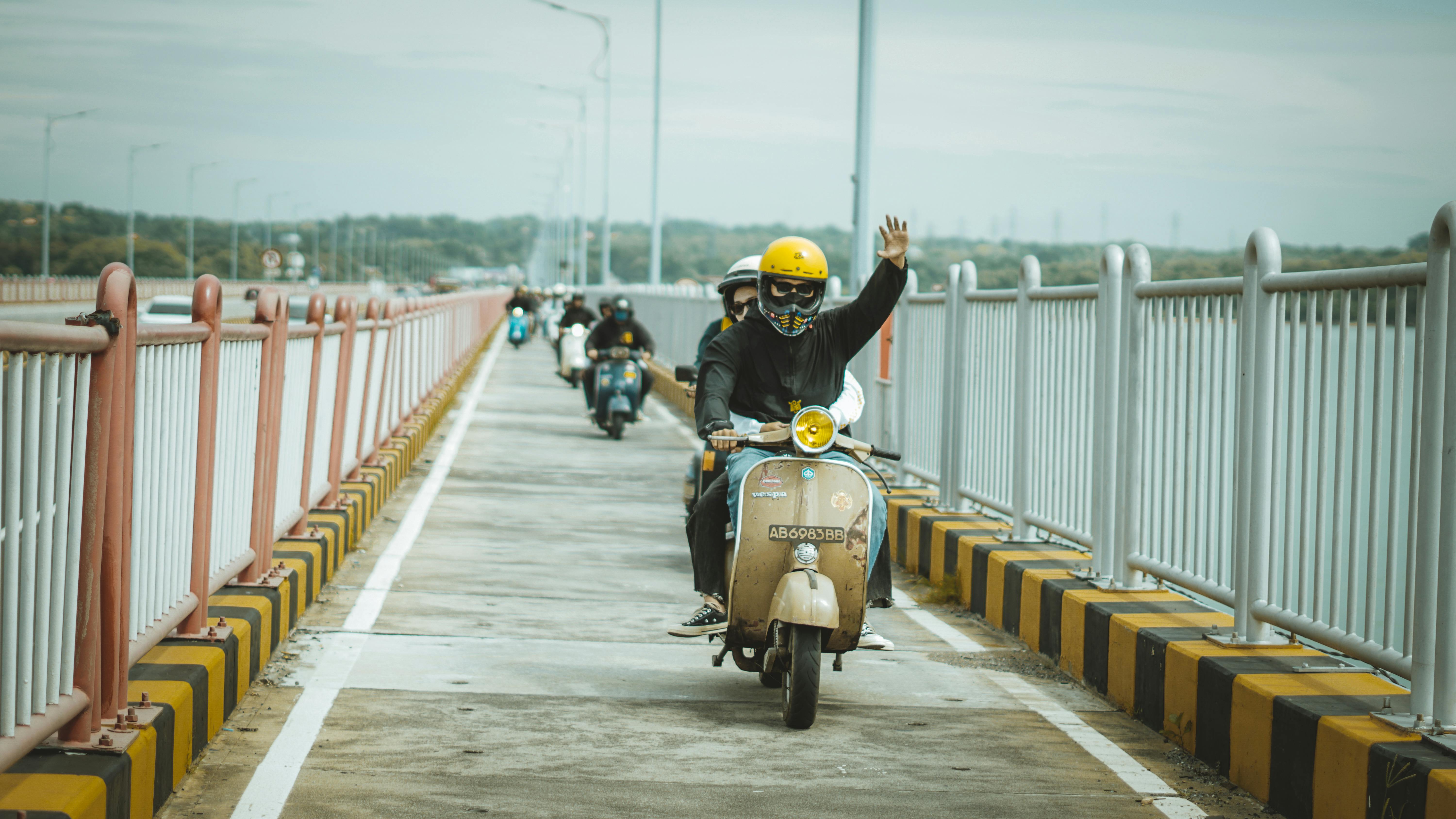 Joyful Scooter Ride on Suramadu Bridge, East Java · Free Stock Photo
