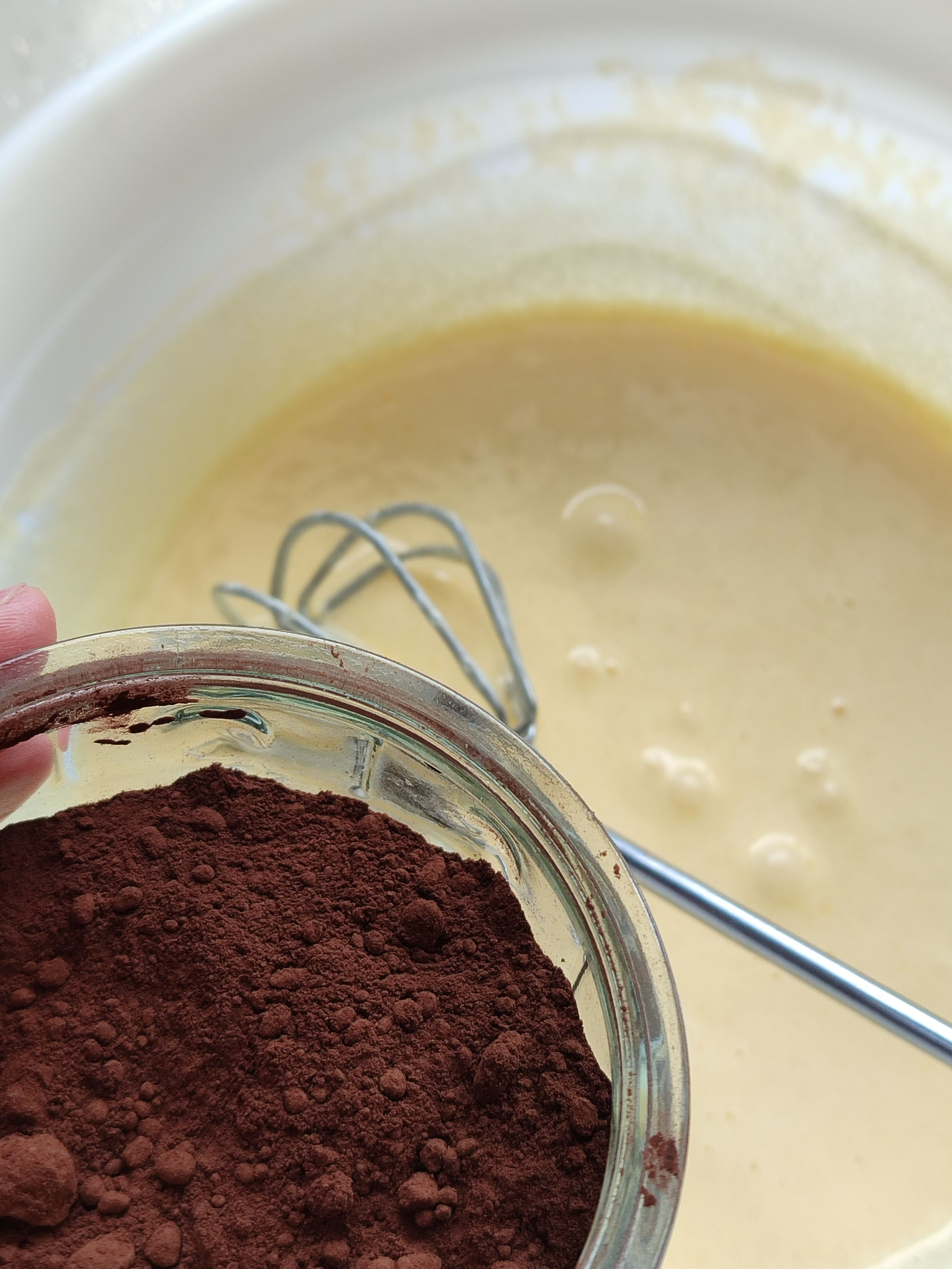 Preparing Chocolate Cake with Cocoa Powder · Free Stock Photo
