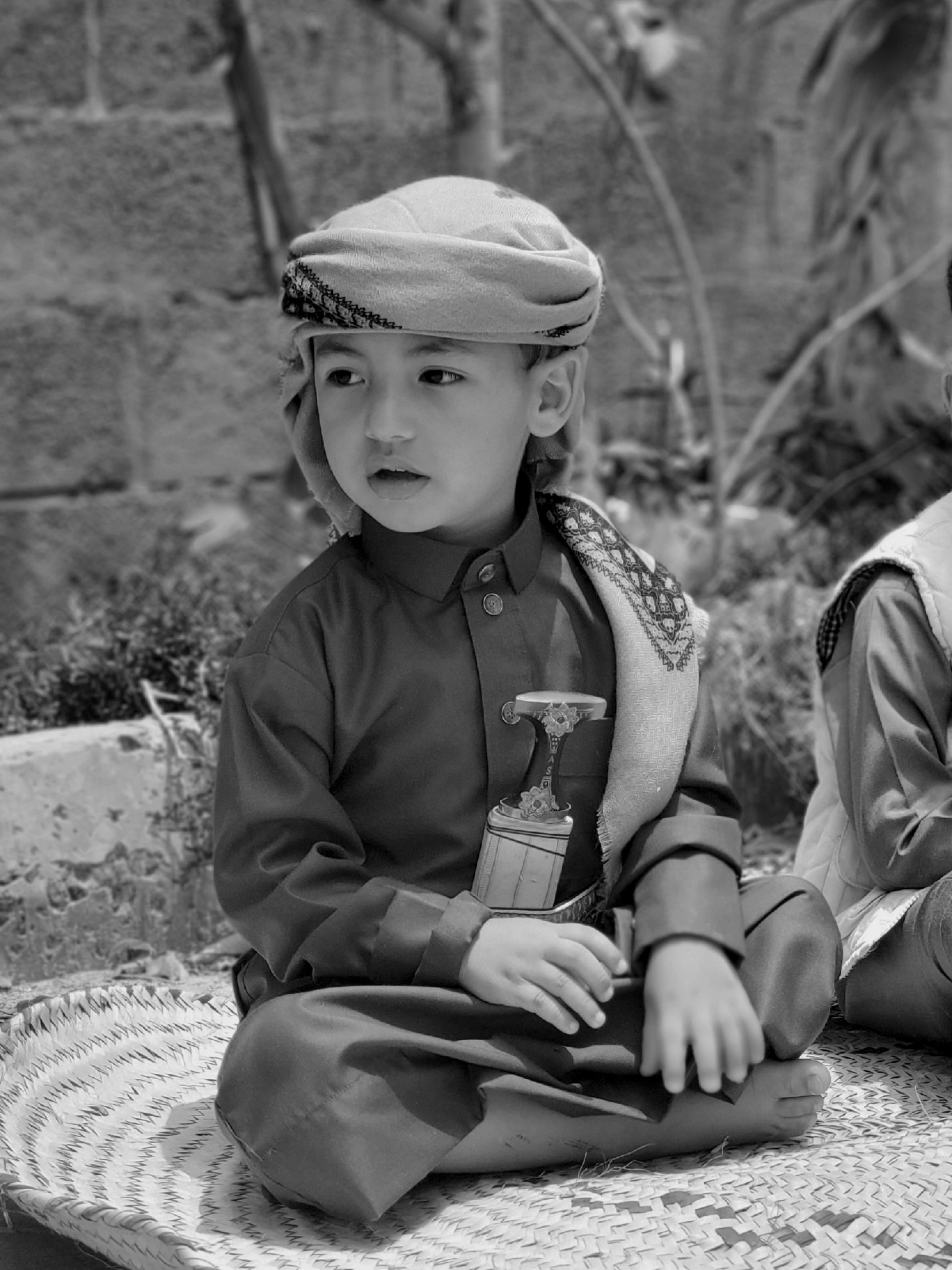 Traditional Yemeni Boy in Cultural Attire · Free Stock Photo