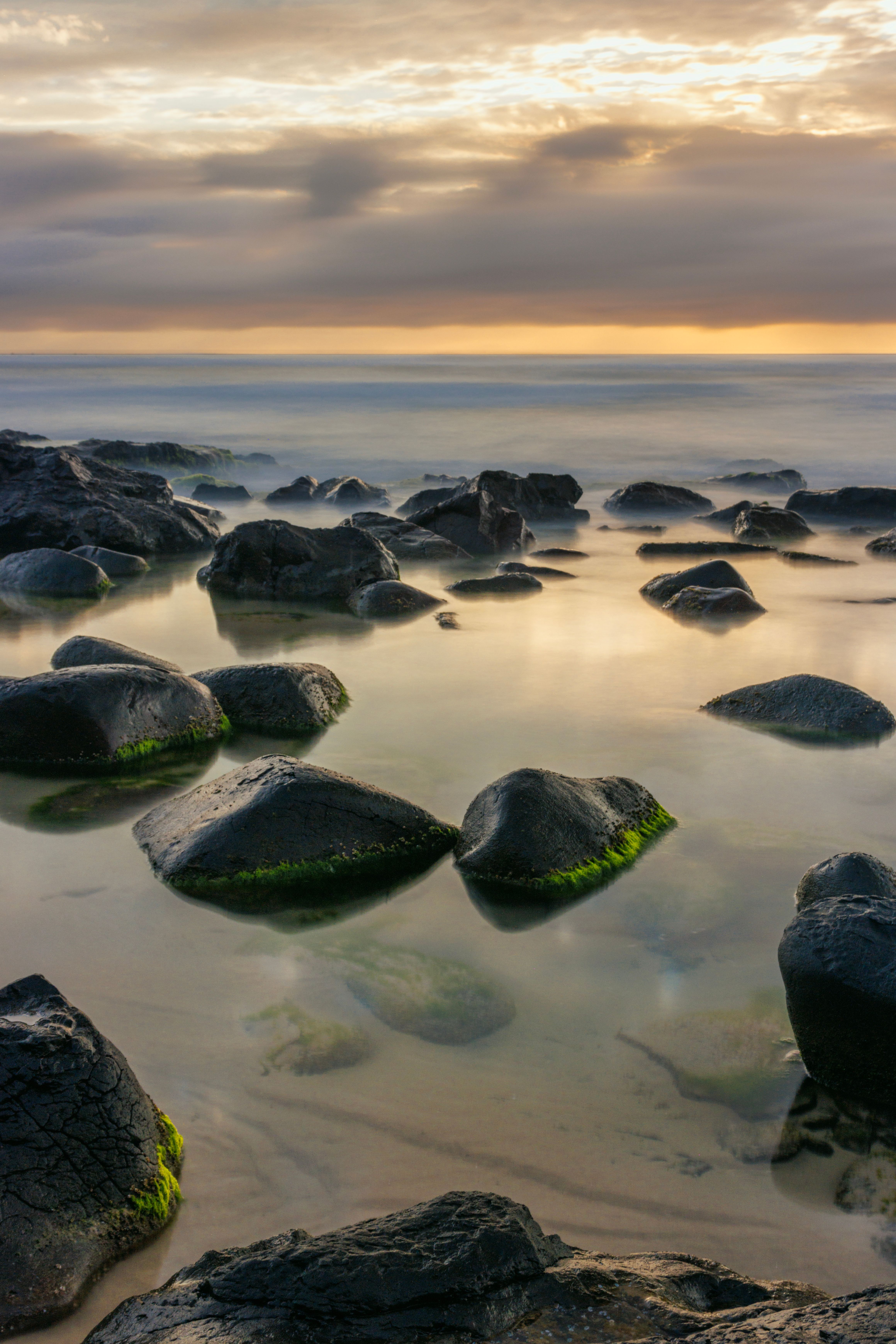 Serene Coastal Rocks at Sunset in Torres, Brazil · Free Stock Photo