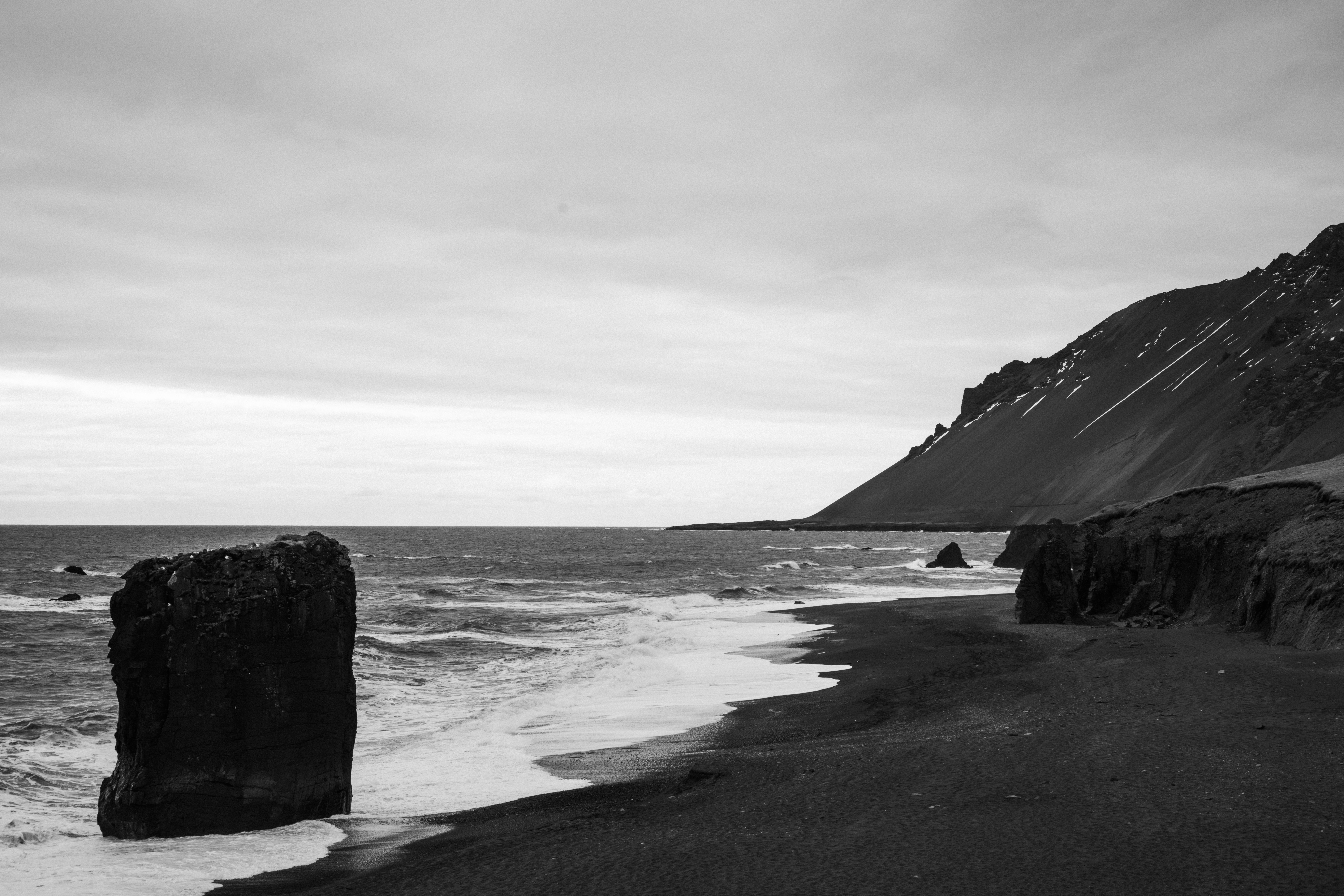 Dramatic Black Beach with Basalt Formations · Free Stock Photo