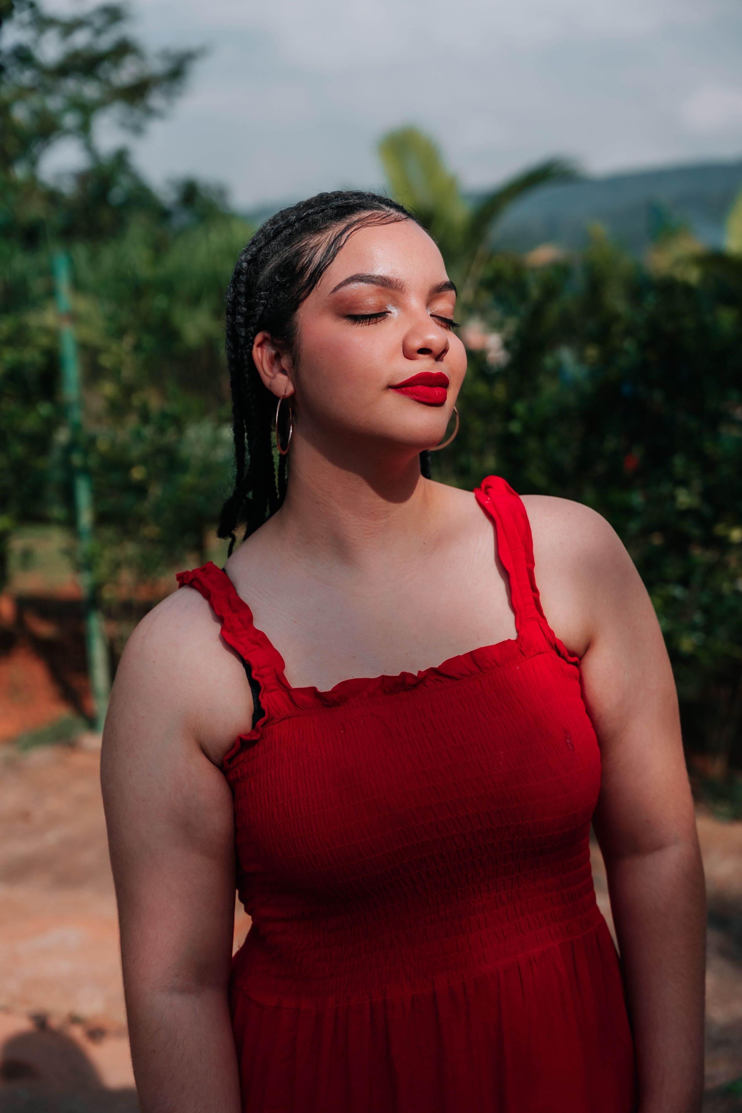 Portrait of Woman in Red Dress Outdoors · Free Stock Photo